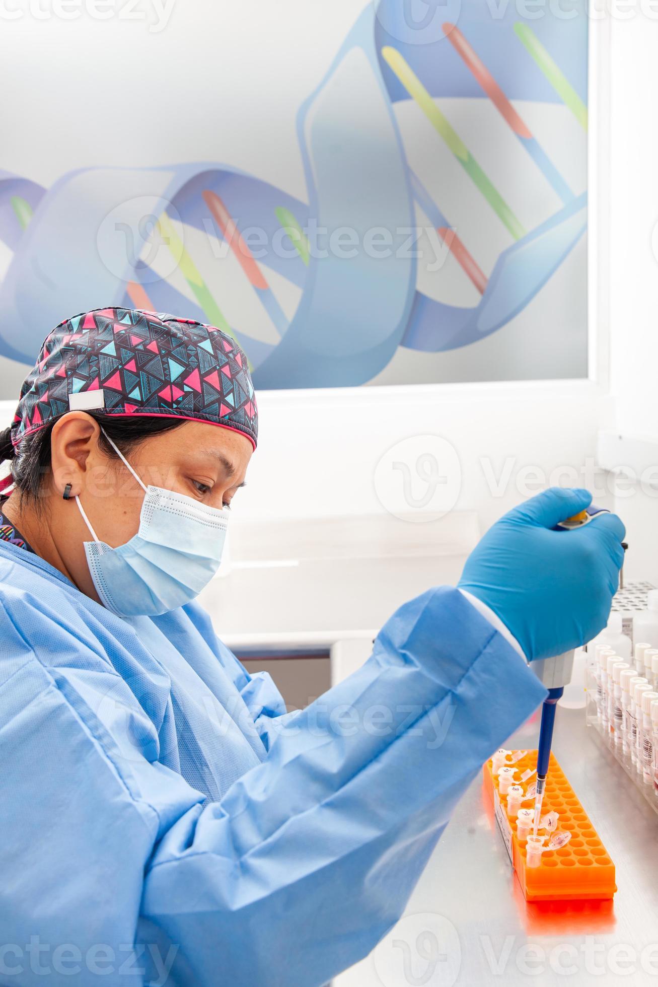 Female scientist extracting DNA using the spin column-based nucleic ... Female scientist extracting DNA using the spin column-based nucleic ...