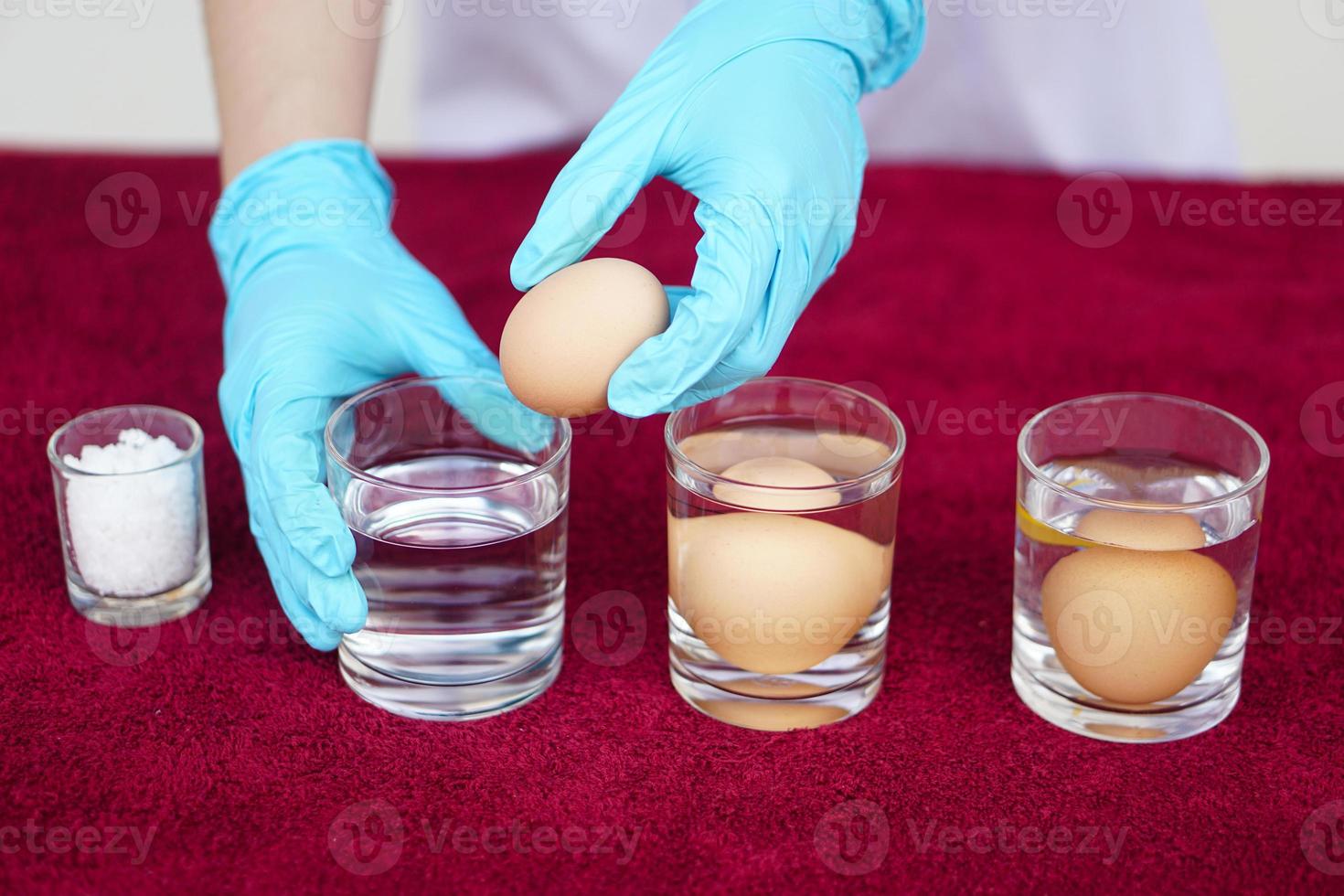 Close up science experiment about eggs in water, compare the density by ...