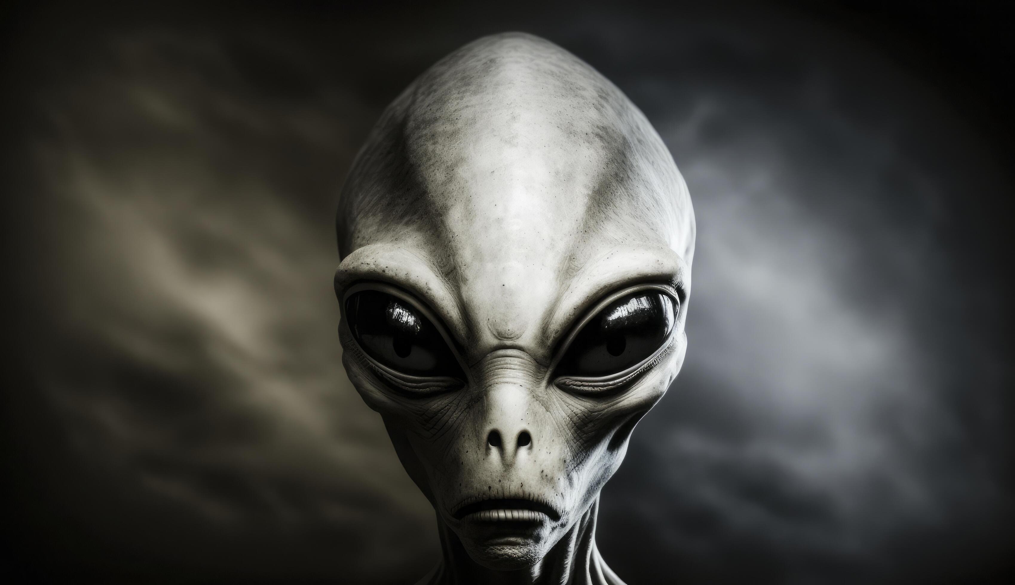 Alien humanoid portait on dark background. Invasion of extraterrestrial. Alien abduction ...