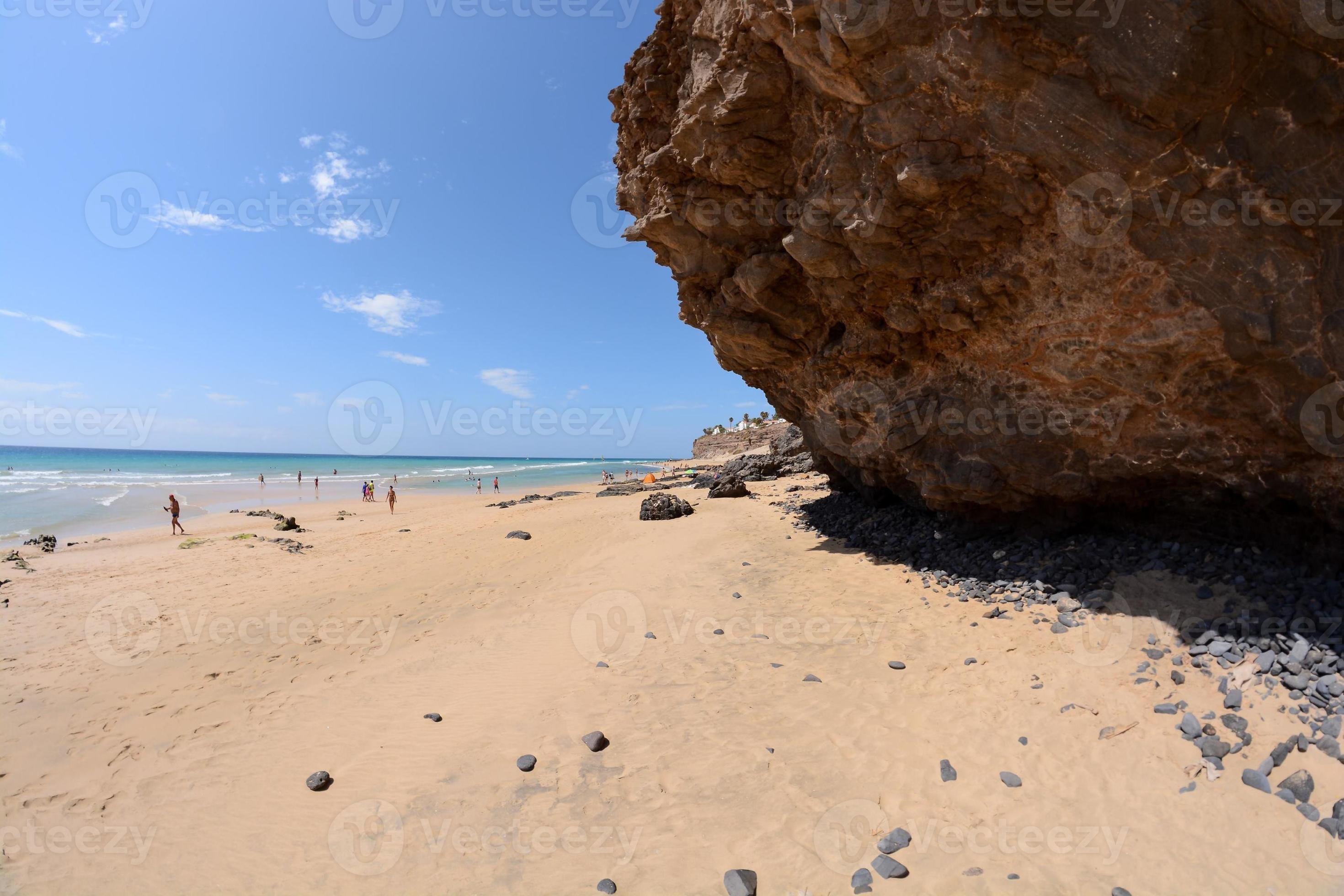 At the beach 22913900 Stock Photo at Vecteezy