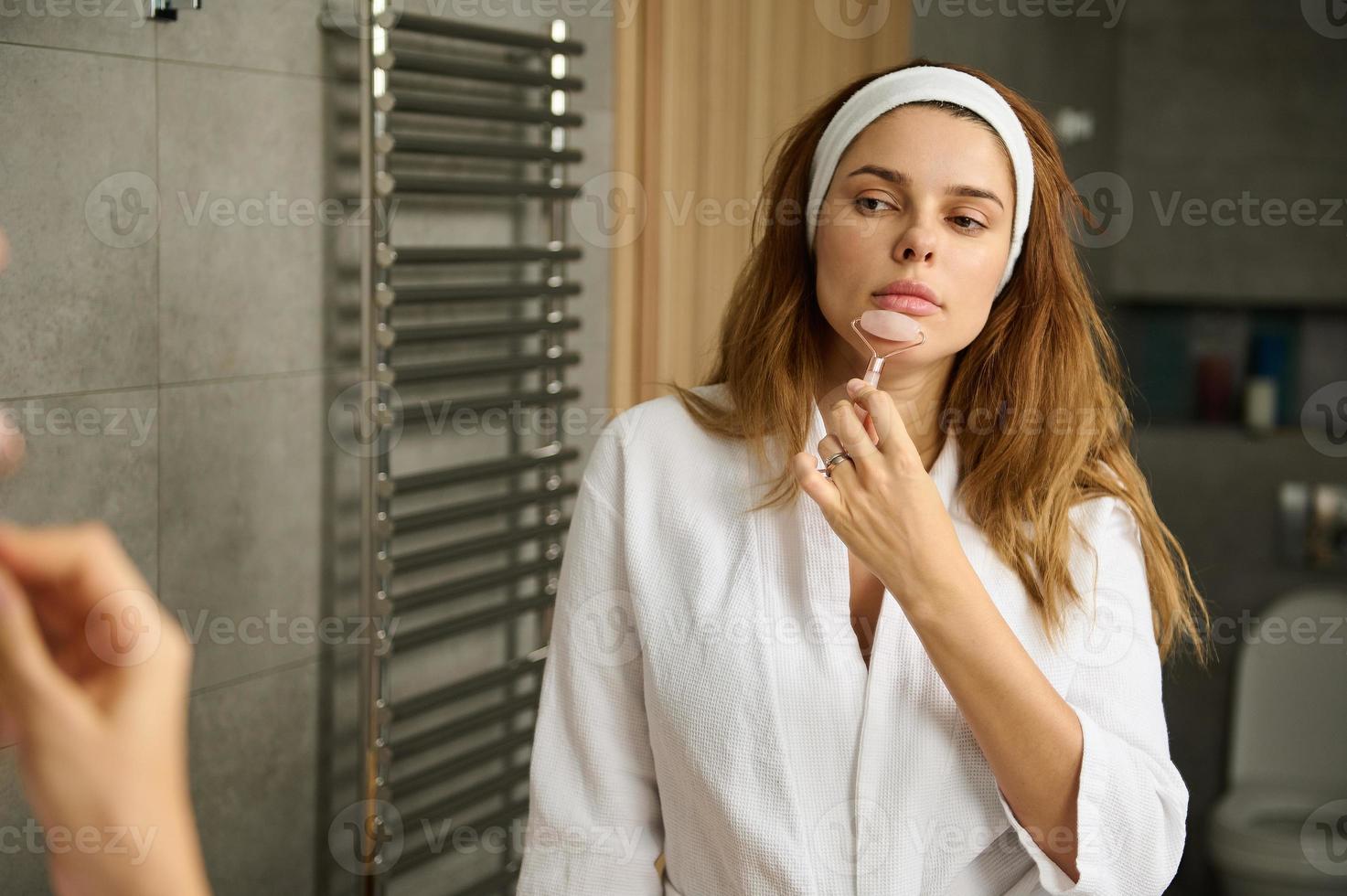 Mirror Reflection Of A Pretty Woman In White Waffle Bathrobe Massaging