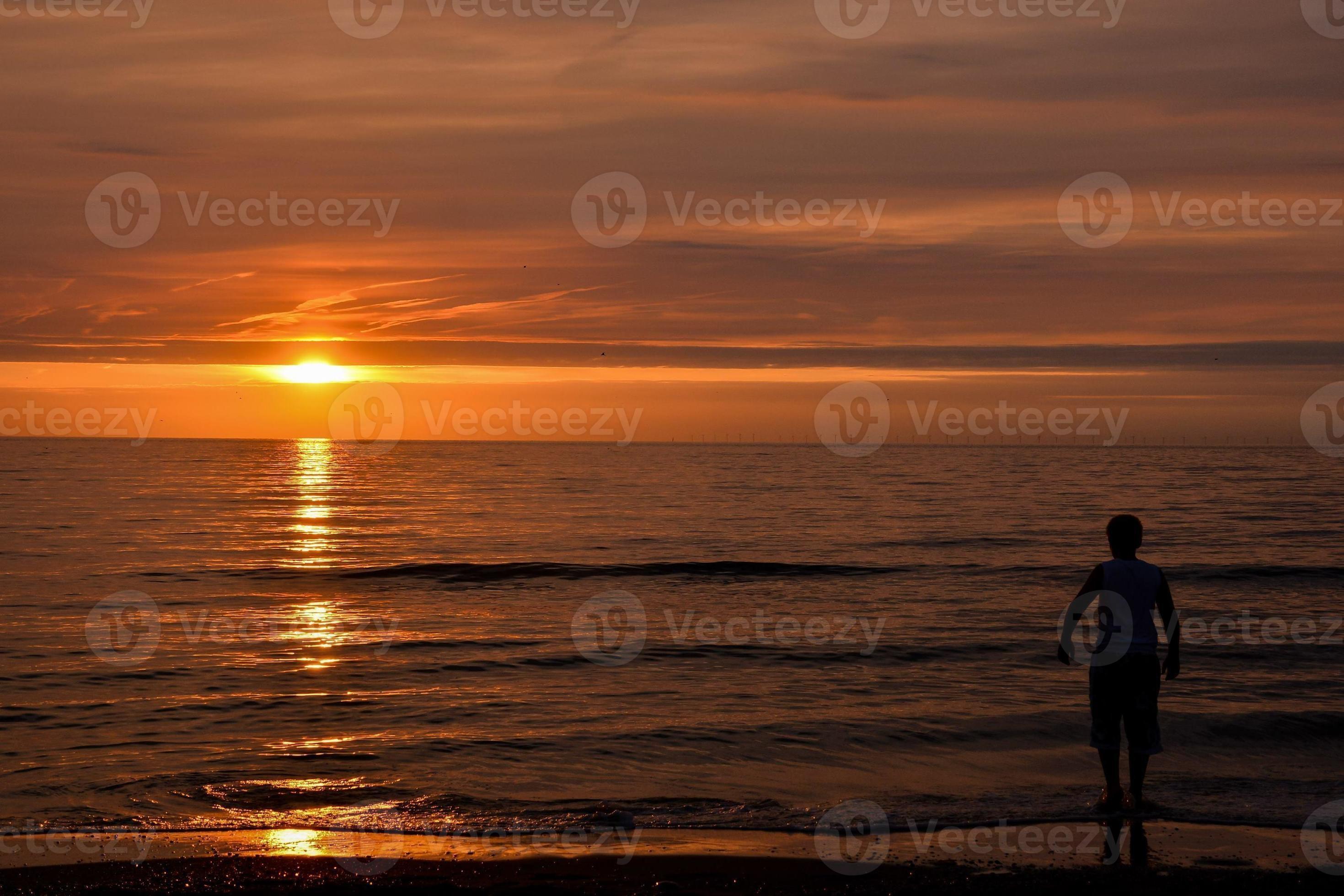 At the beach 22979387 Stock Photo at Vecteezy