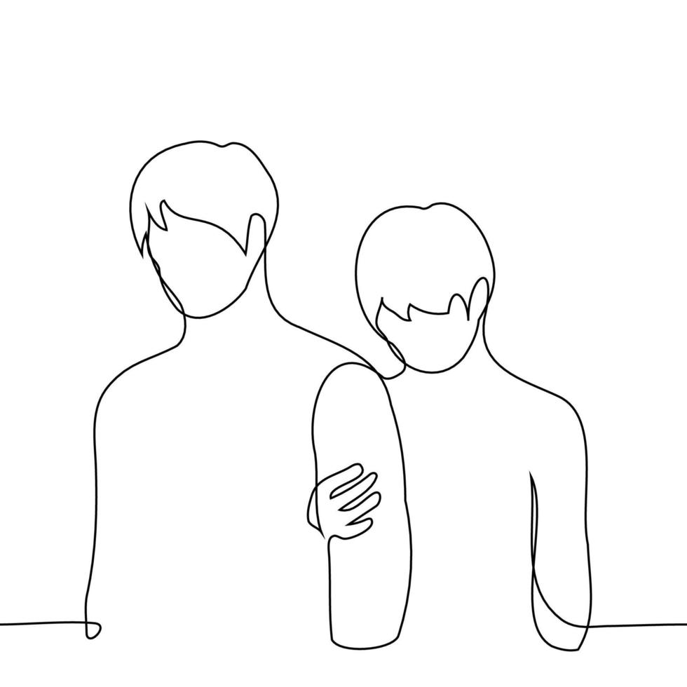 young man with his head down holds his hand and stands behind a tall ... young man with his head down holds his hand and stands behind a tall ...
