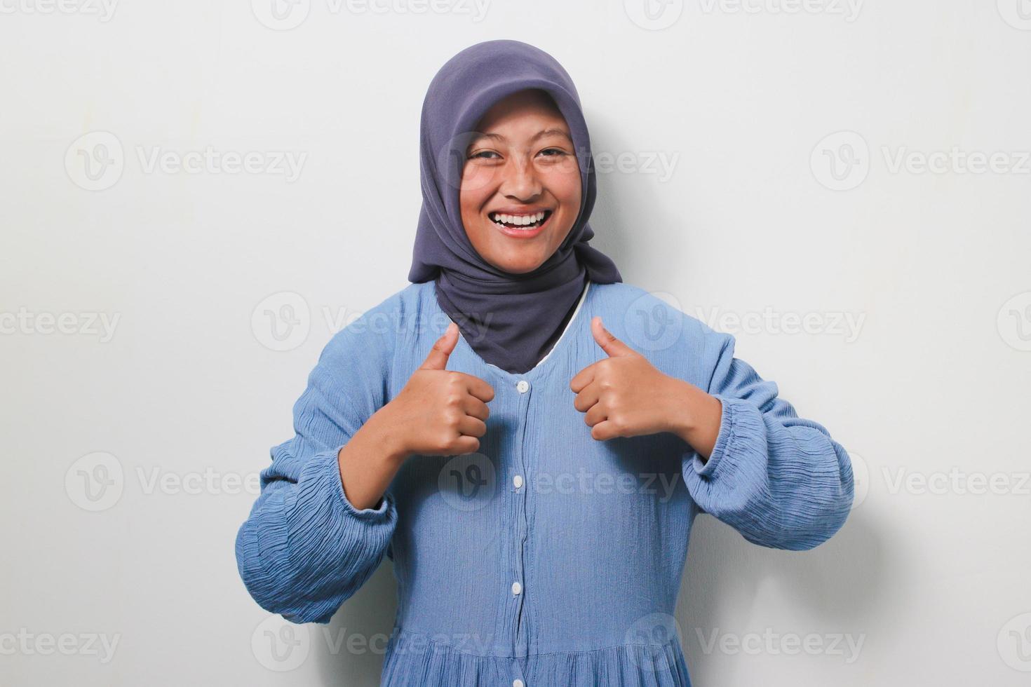 Cheerful Young Asian Girl In Hijab Showing Two Thumbs Up 23053938 Stock