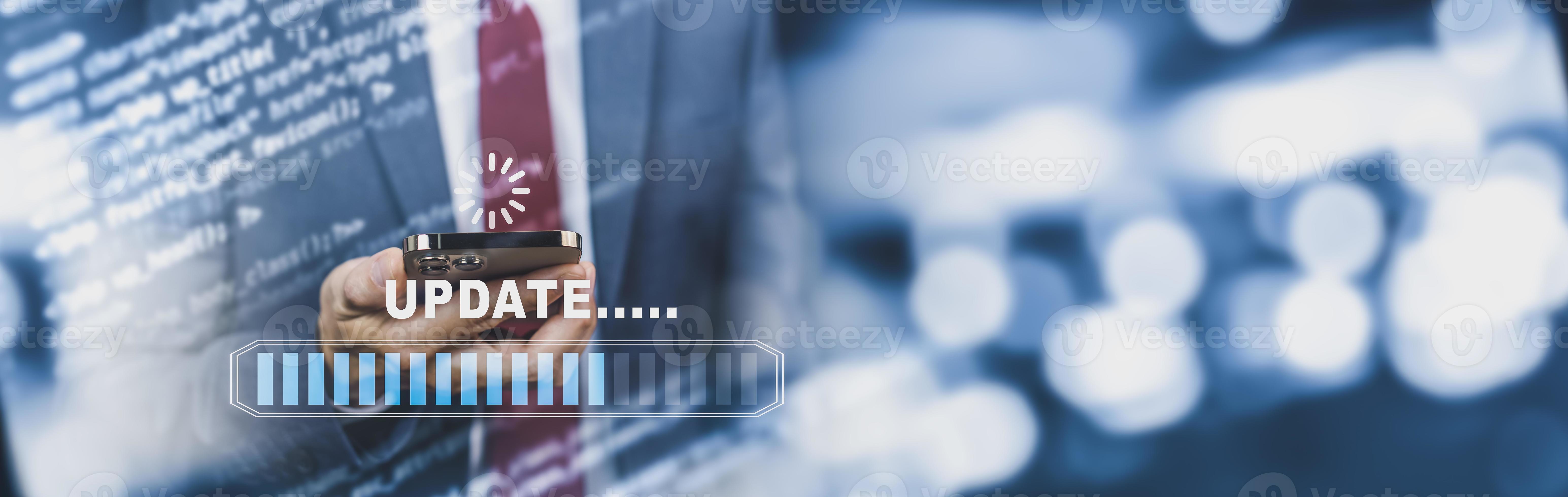 Businessman hold smartphone with Update Software Computer Program ...