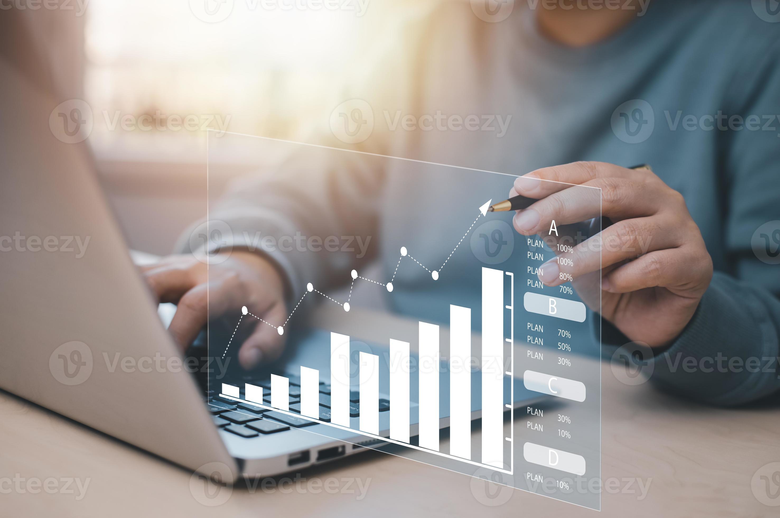 Working on laptops with Planning analysis and Project management online ...