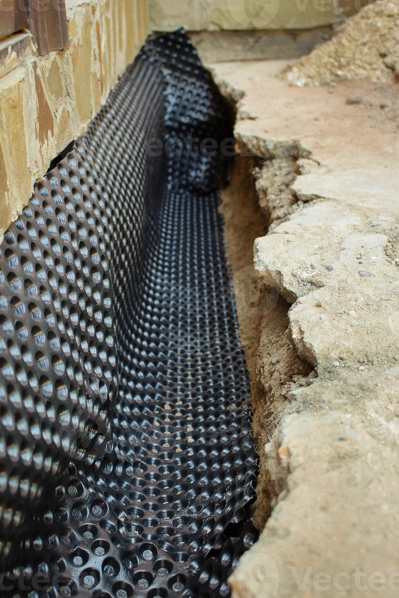 Waterproofing foundation outside house. Protecting foundation of home ...