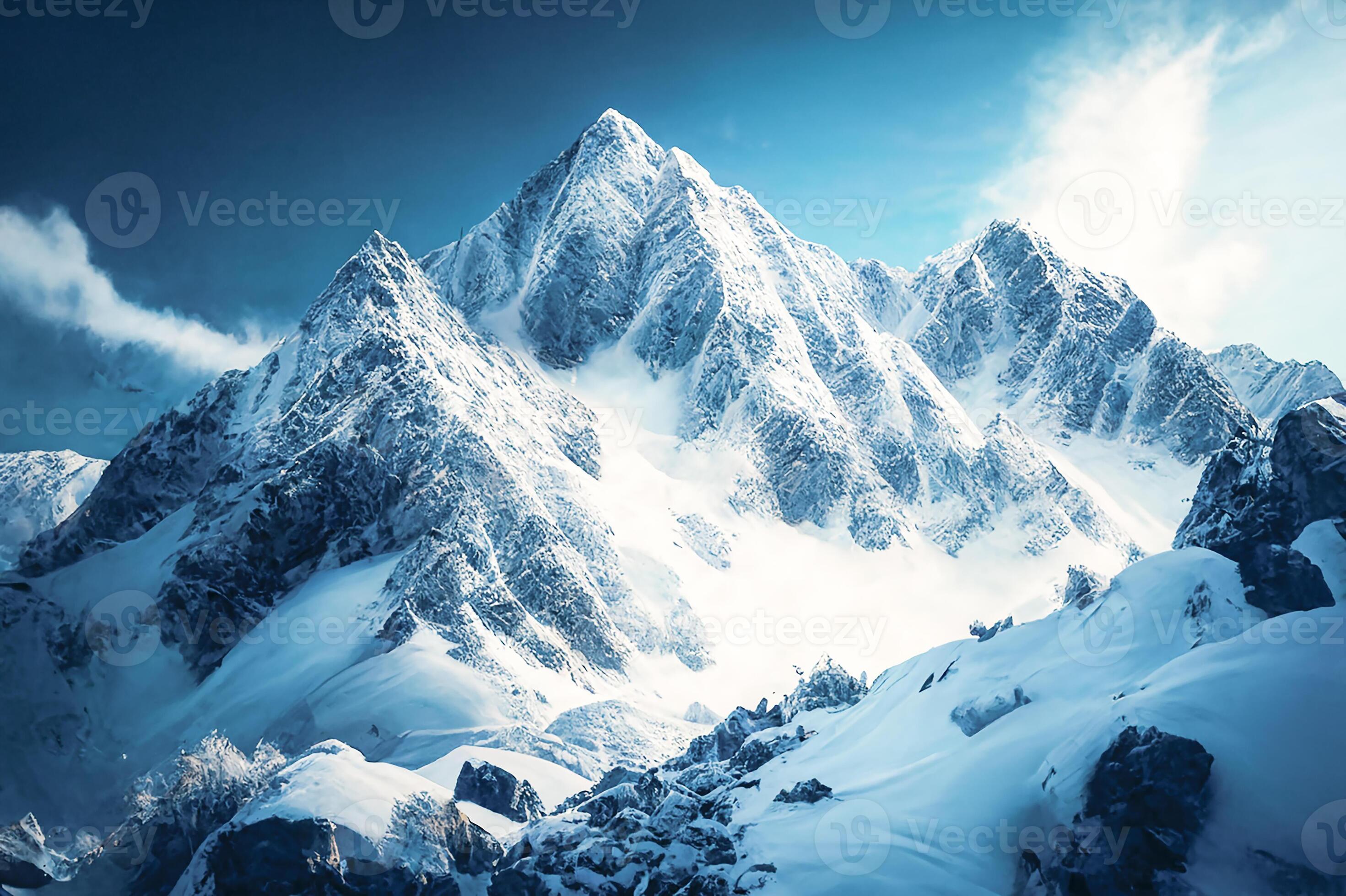 High mountains with a glacier, the tops of the mountains covered with ...