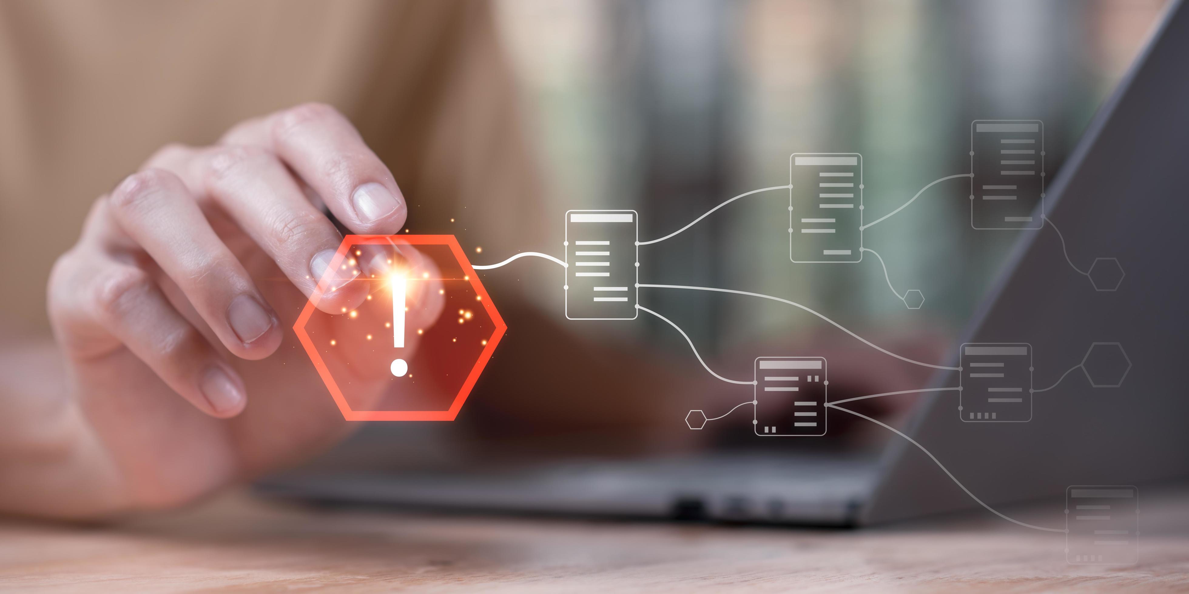 Programmer and virtual icons , exclamation mark ,alarm,computer virus ...