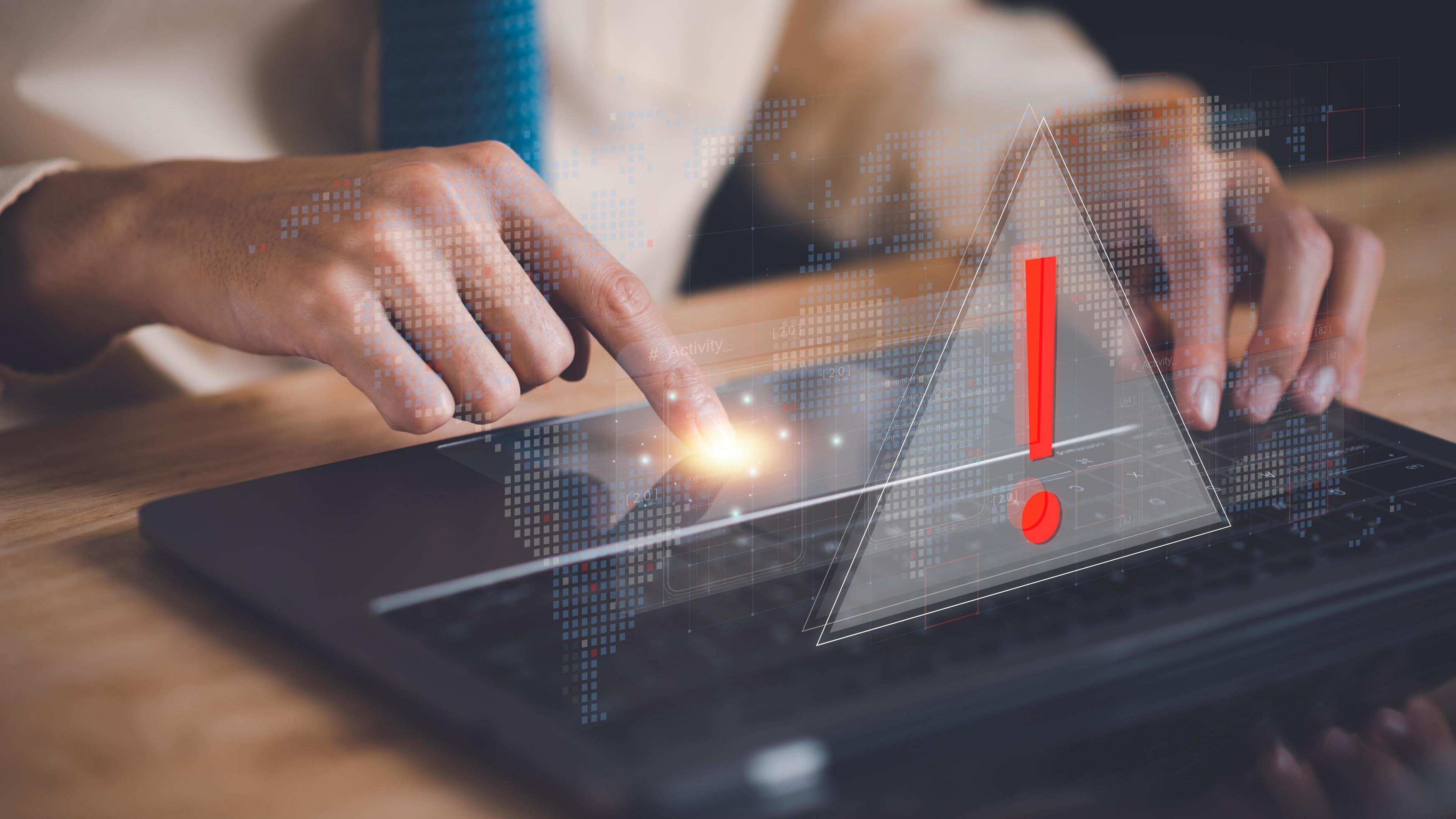 Programmer and virtual icons , exclamation mark ,alarm,computer virus ...