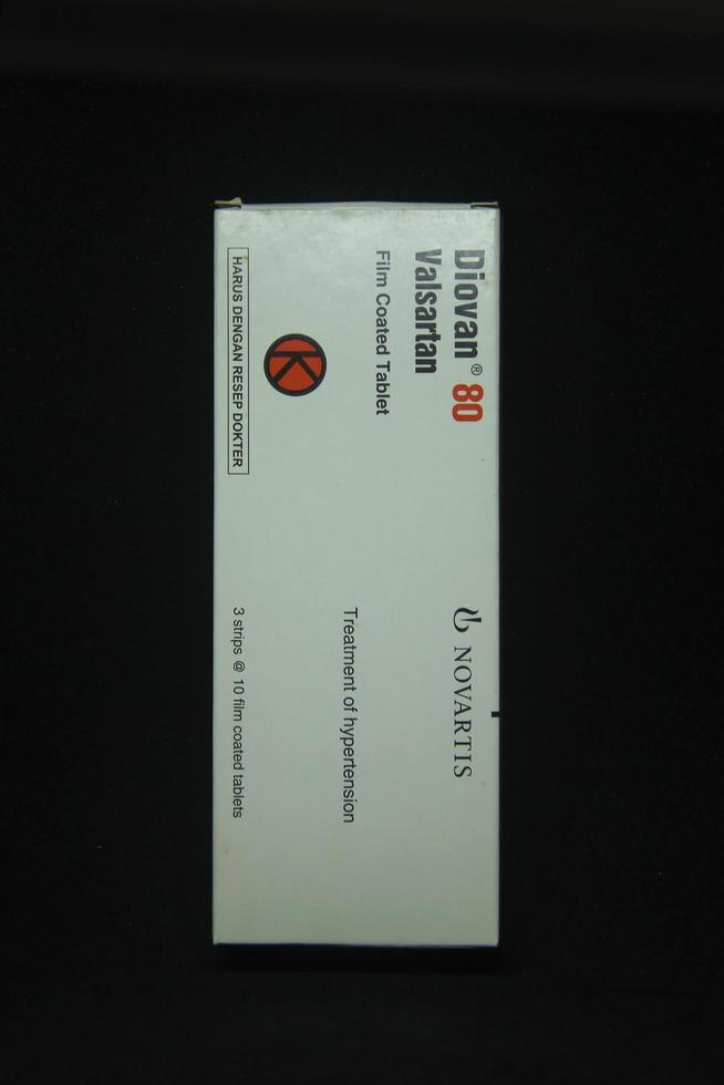 Jakarta, Indonesia - April 21th, 2023 - Novartis film coated medicine tablet diovan 80 mg white ...