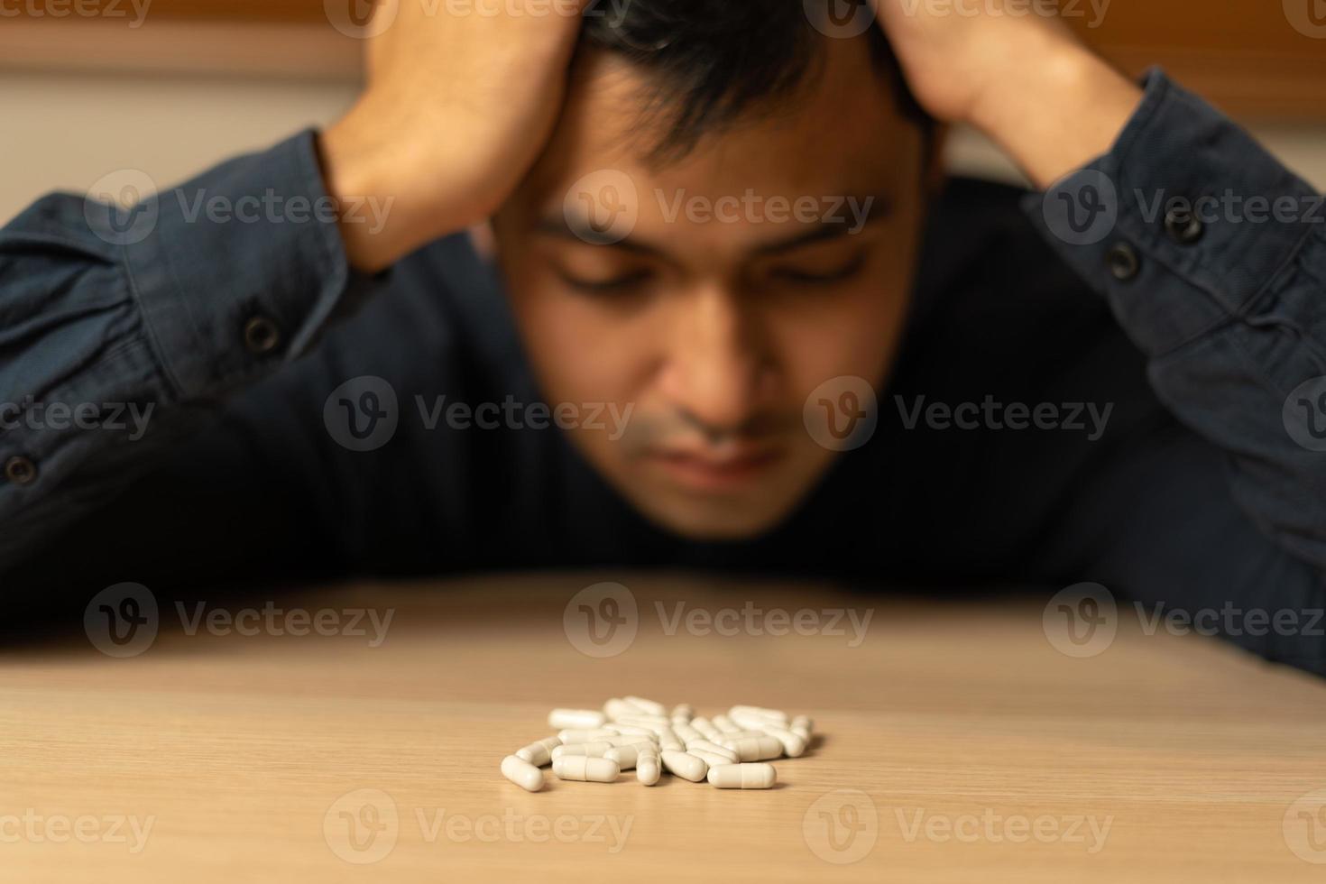asian man use pills overdose, stressed, sad, drug abuser, drug addict ... asian man use pills overdose, stressed, sad, drug abuser, drug addict ...