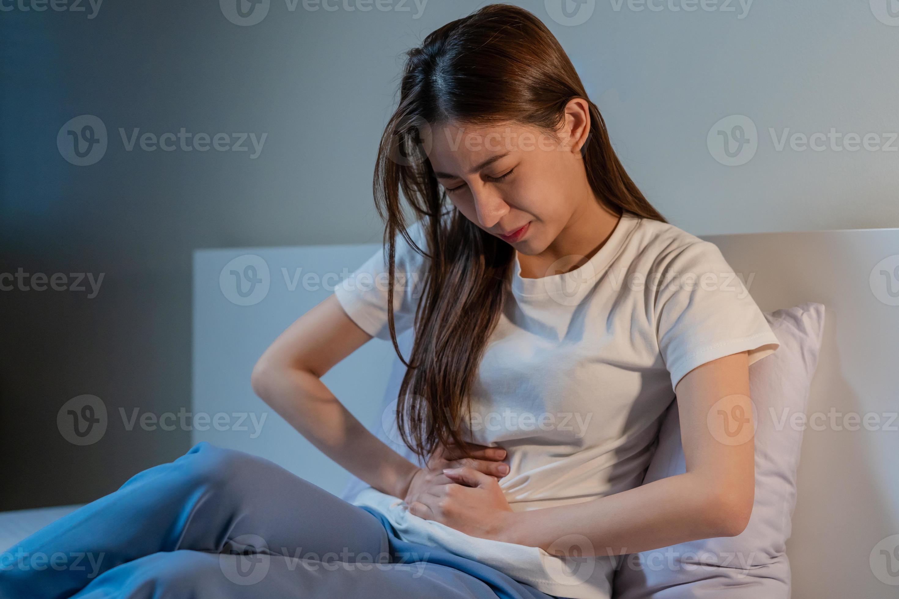 Flatulence ulcer, asian young woman in belly, stomach ache from food poisoning, abdominal pain ...
