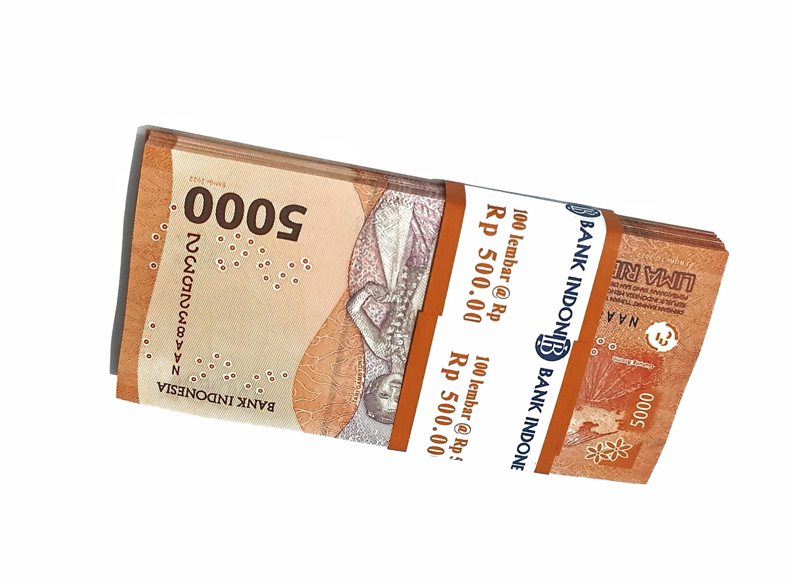 Isolated Photo Of A Wad Or A Bundle Of Five Thousand Rupiah Bills In isolated-photo-of-a-wad-or-a-bundle-of-five-thousand-rupiah-bills-in