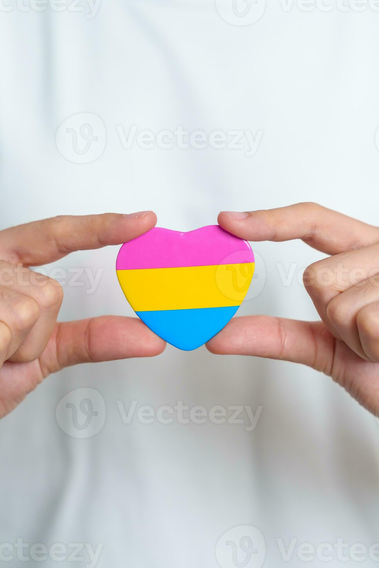 Pansexual Pride Day And Lgbt Pride Month Concept Hand Holding Pink