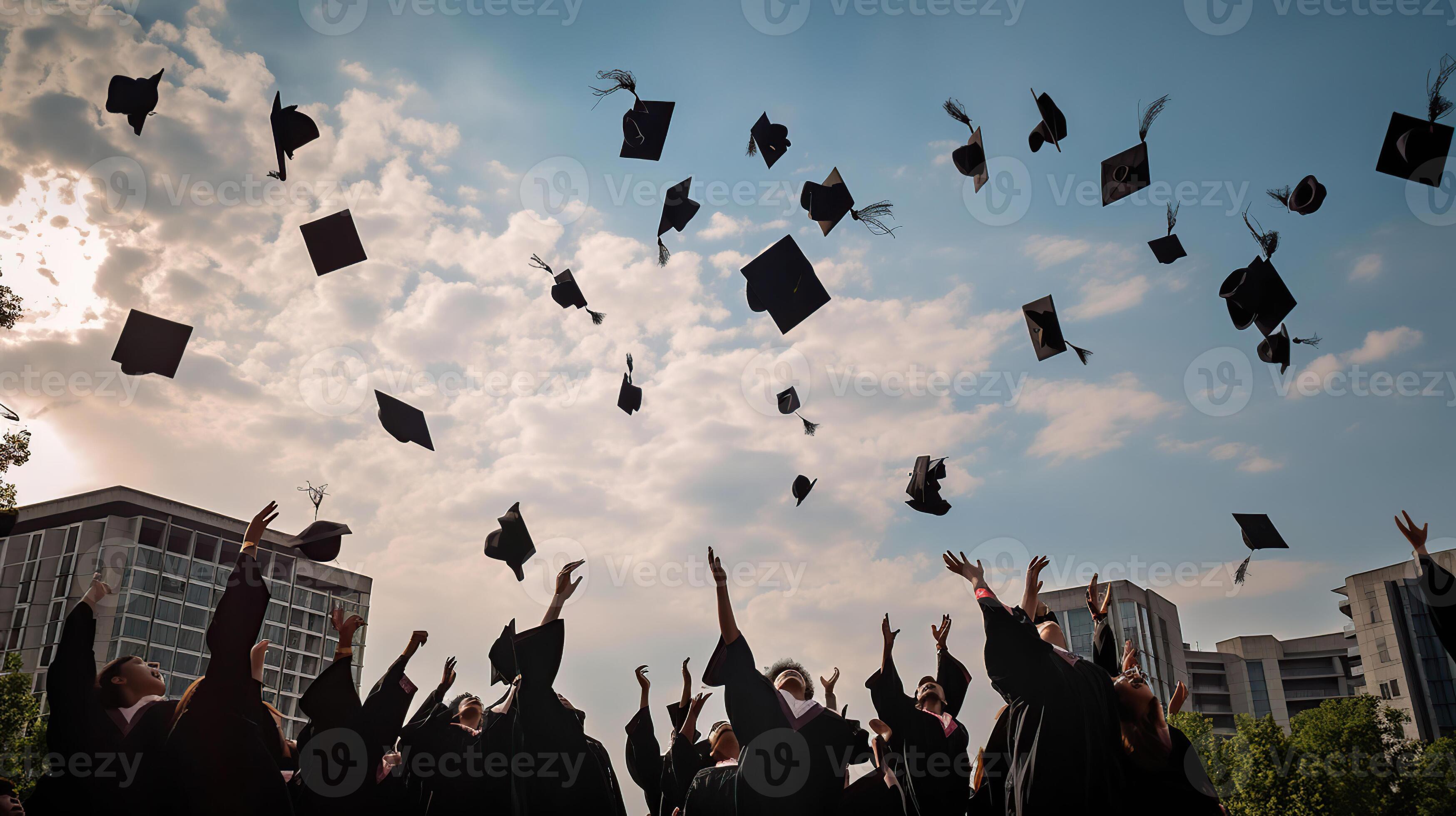 Blue Graduation Caps In The Air