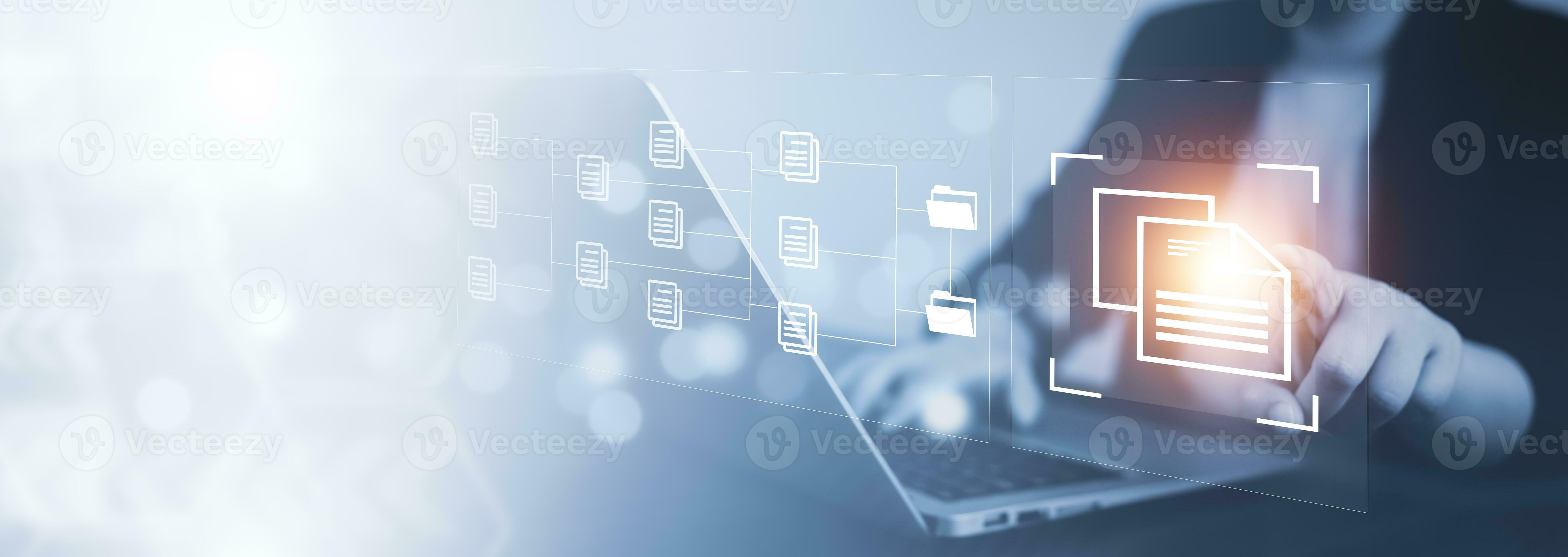 Businesswoman working on laptop with virtual screen. Online documentation database, IT ...