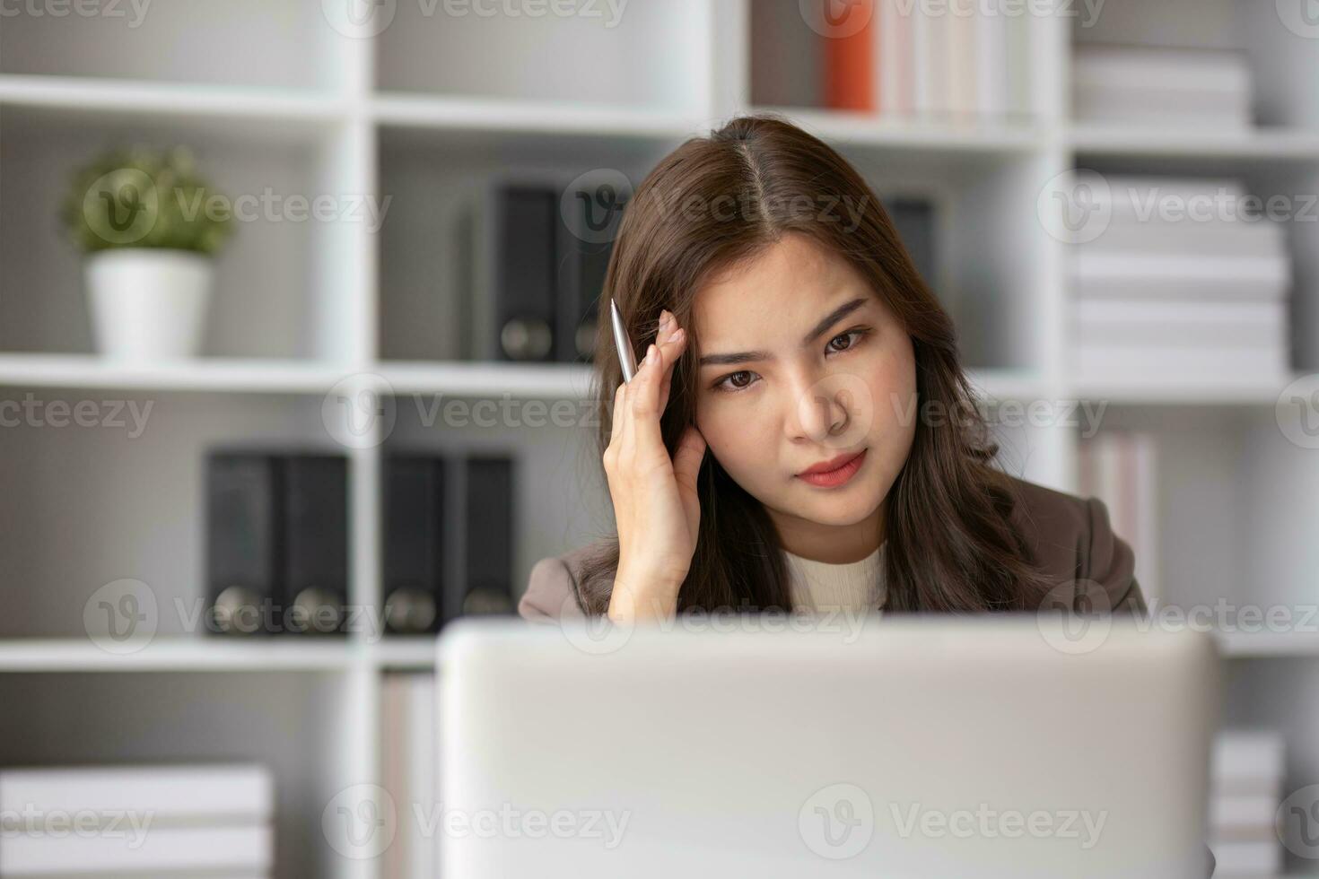 tired business woman sleepy and bored from sitting at a desk for a long ...