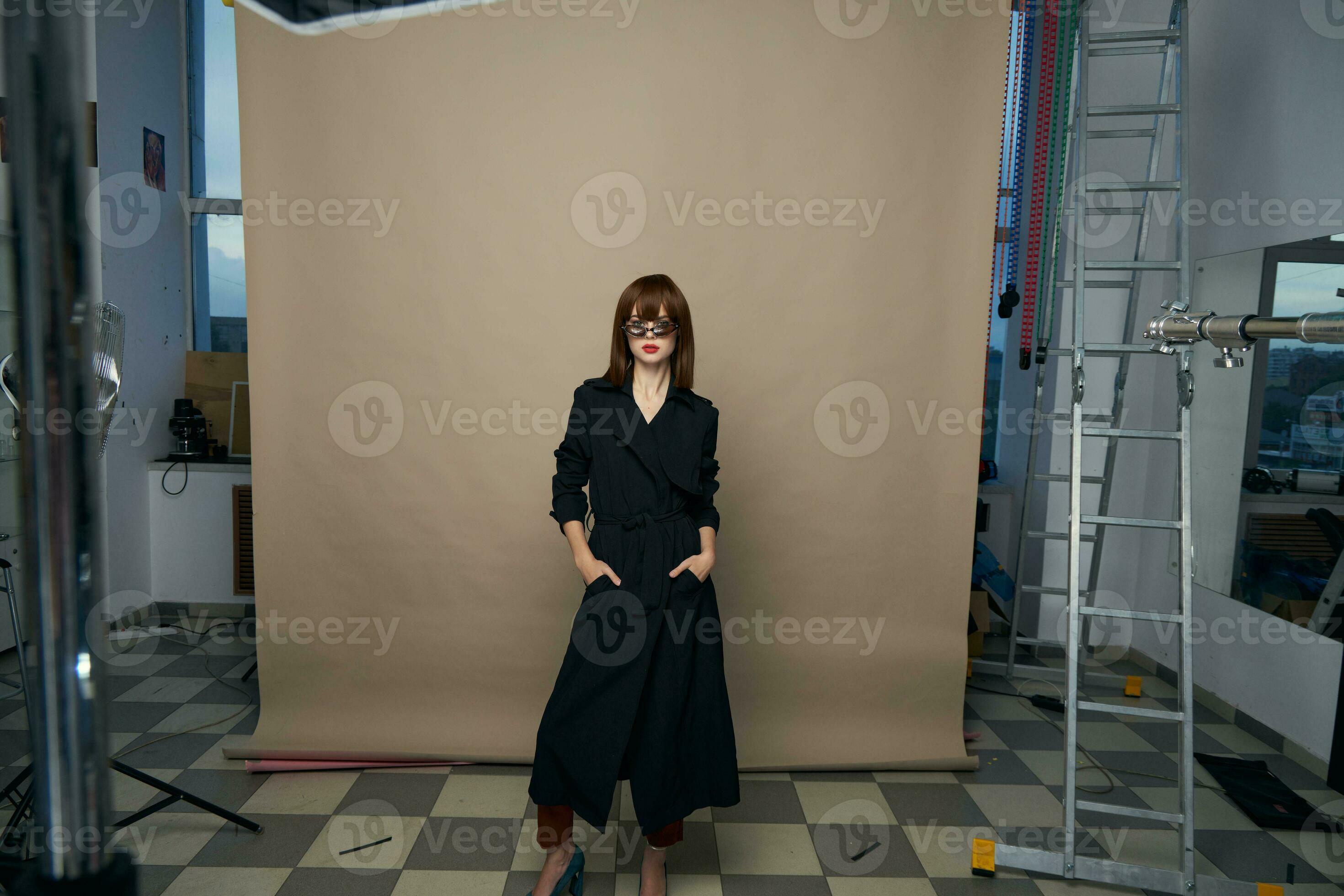 Fashionable woman studio black coat red lips Indoor paper background. 23415776 Stock Photo at ...