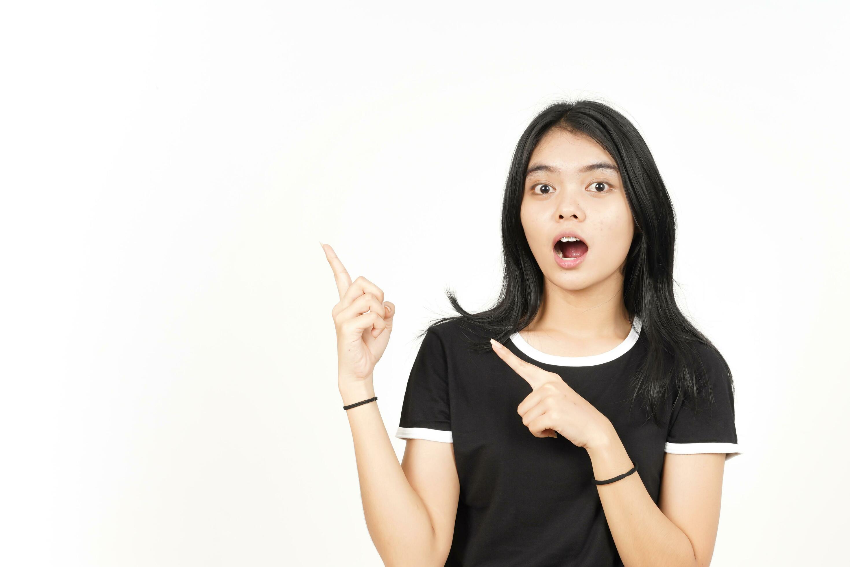 WOW Face and Showing Product and Pointing Side using forefinger Of Beautiful Asian Woman ...