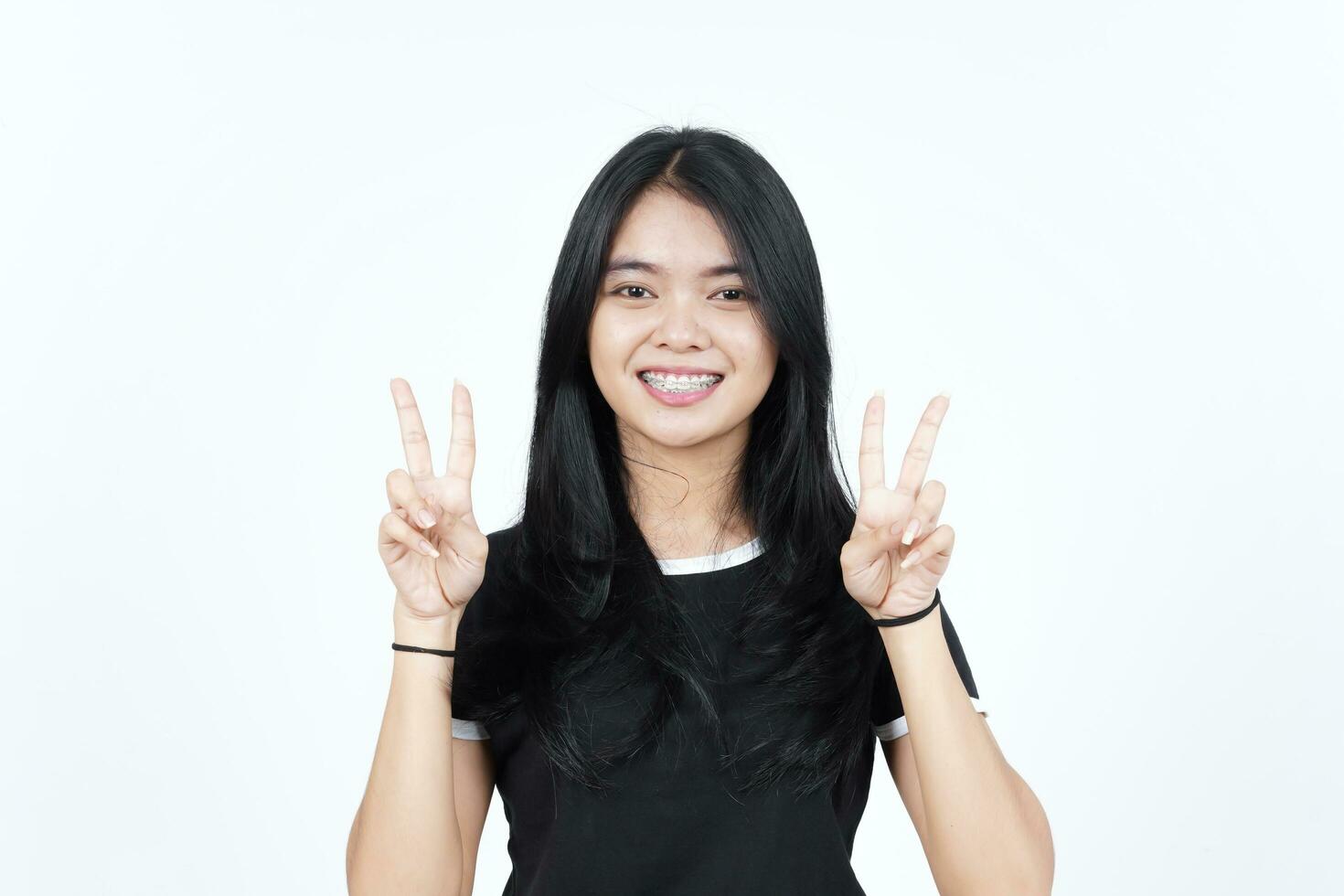 Showing Peace Sign Or Finger V Sign Of Beautiful Asian Woman Isolated On White Background