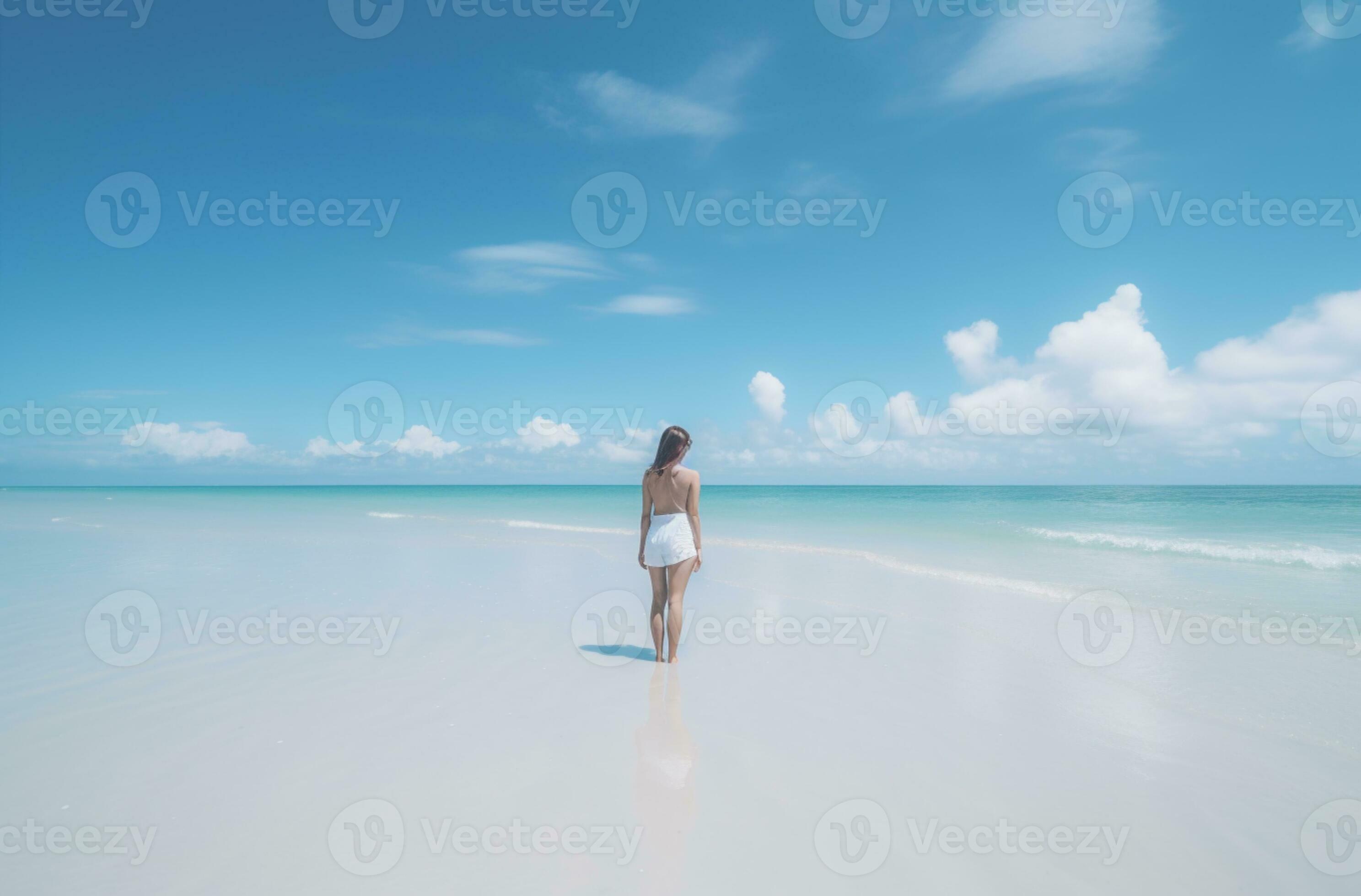 Beautiful Woman In White Dress And Hat Walking On The Beautiful