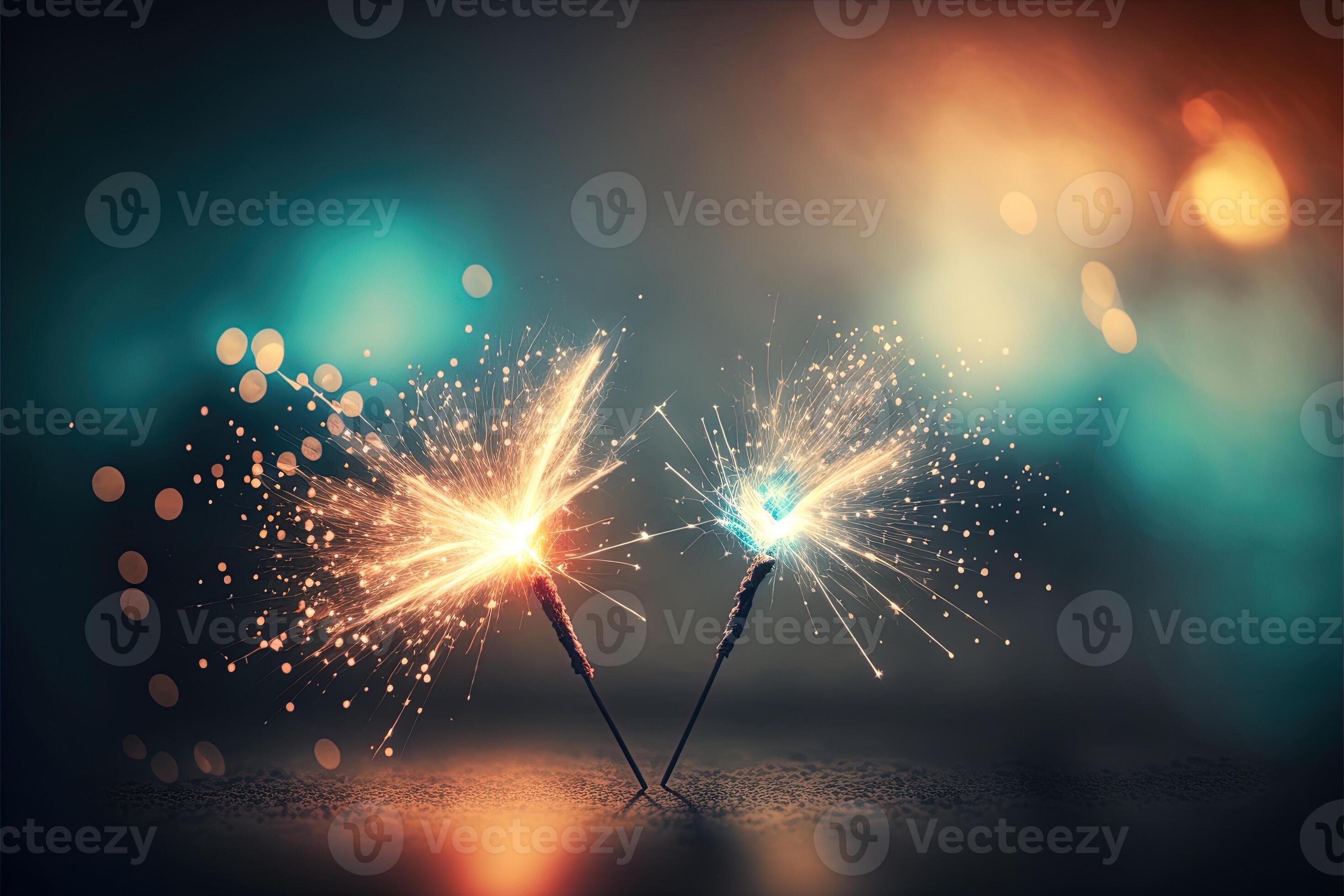 Two sparklers in an obscure background with lots of copy space, perfect for backgrounds happy ...