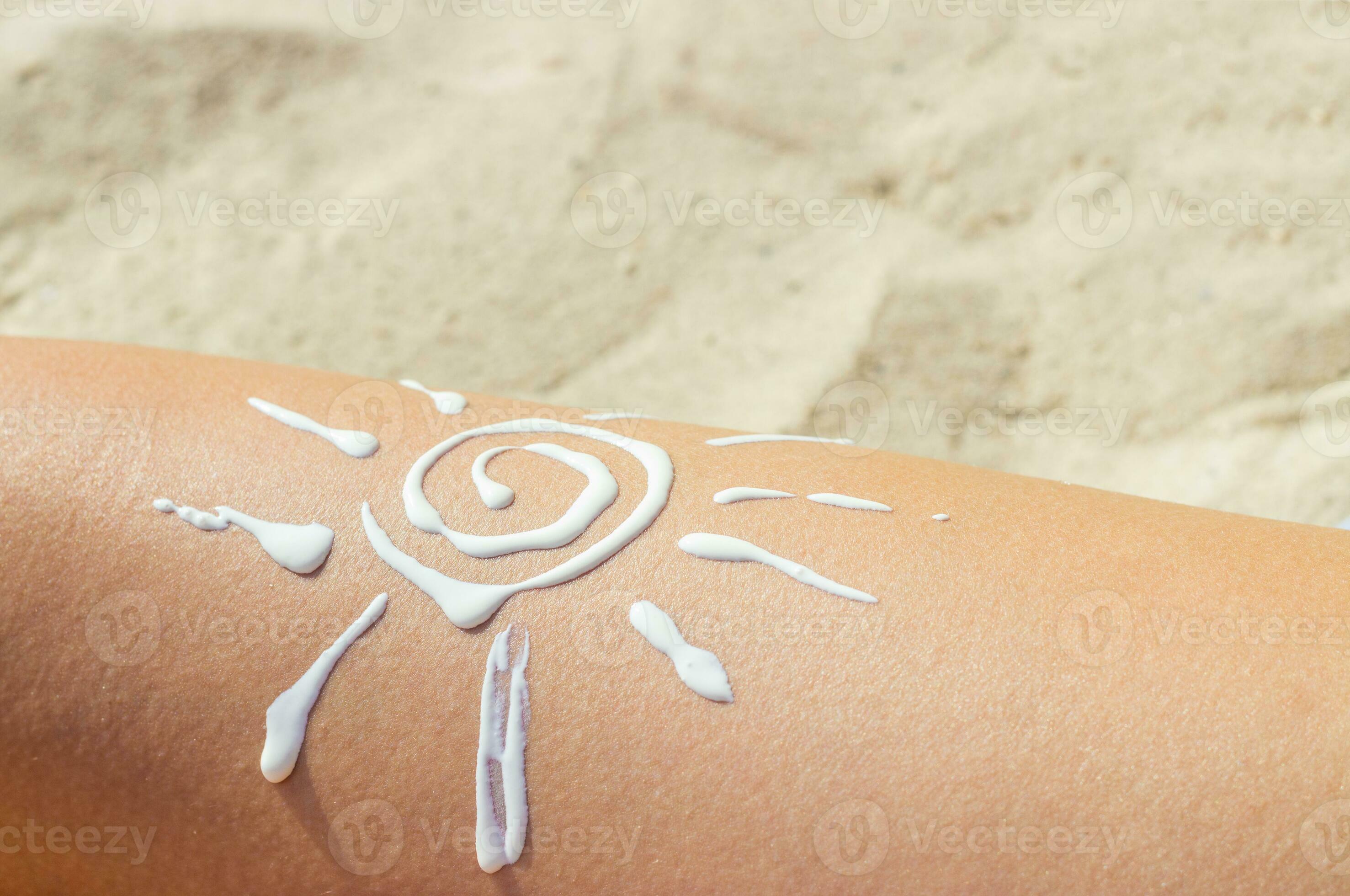 Woman Applying Sunscreen Cream On Her Legs In A Tropical Ambient