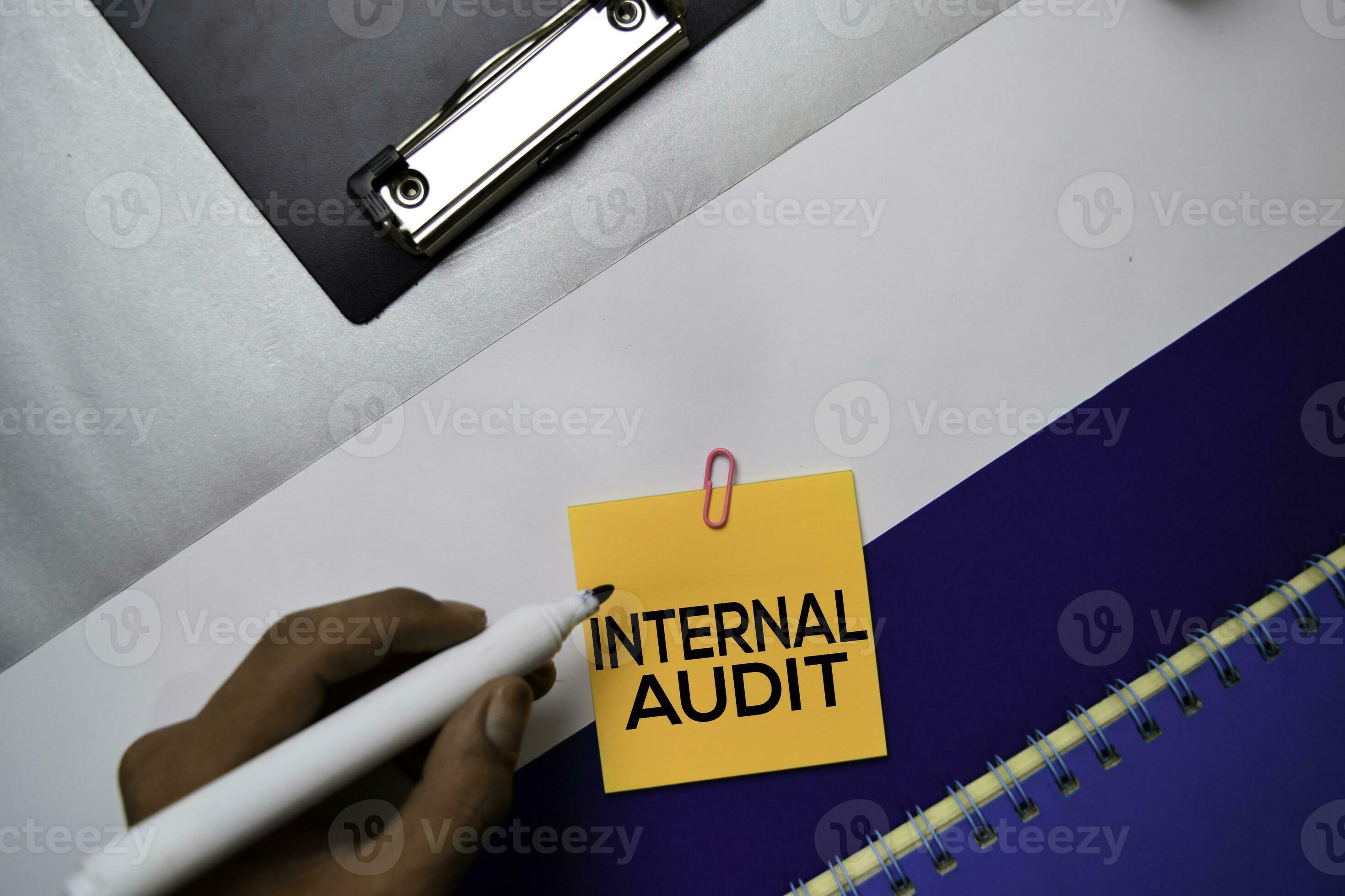Internal Audit text on sticky notes with color office desk concept ... Internal Audit text on sticky notes with color office desk concept ...