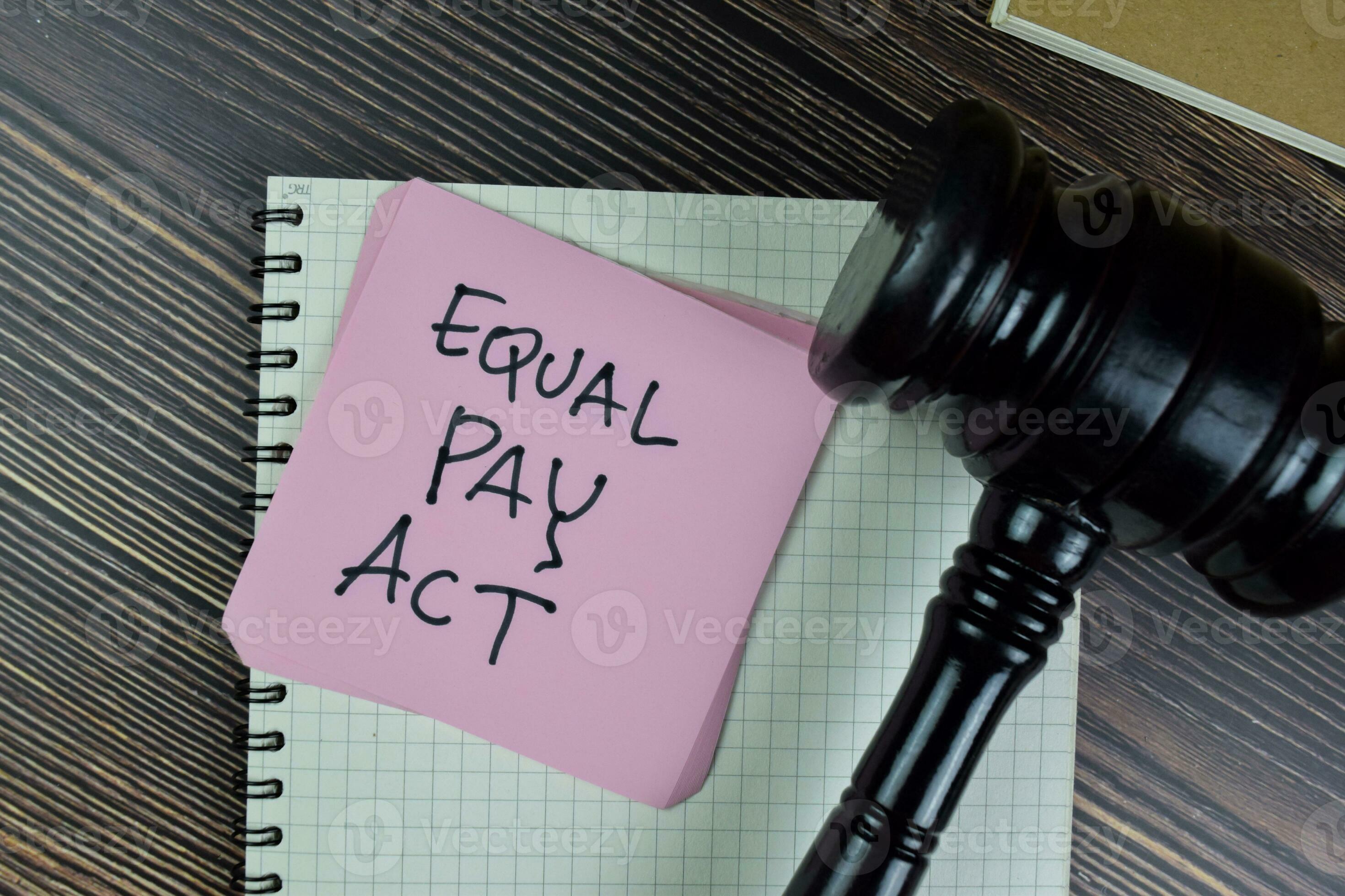 Concept of Equal Pay Act write on sticky notes with gavel isolated on ...
