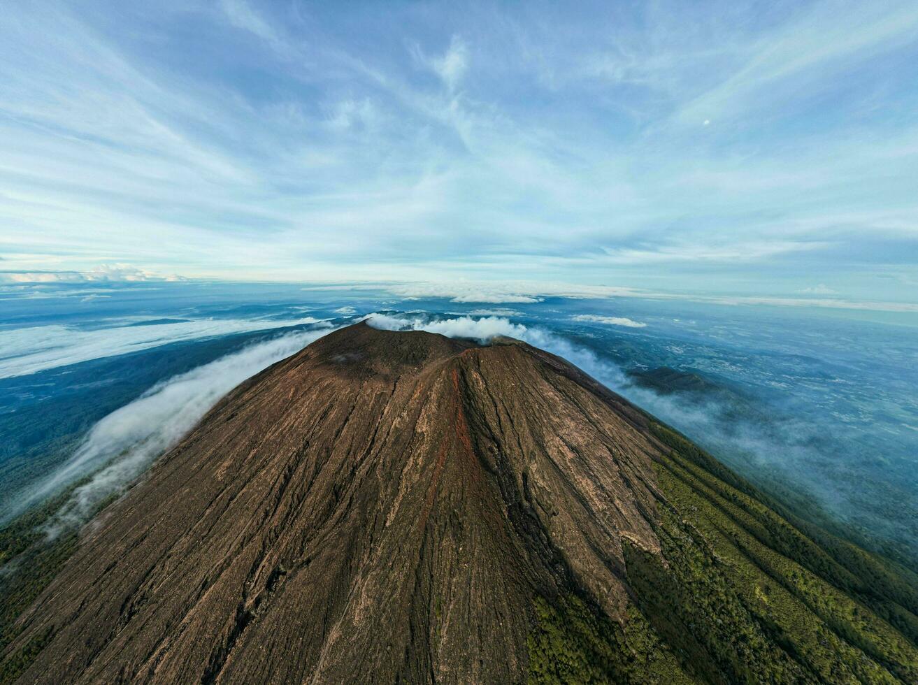 Aerial view of Mount Slamet or Gunung Slamet is an active stratovolcano in the Purbalingga ...
