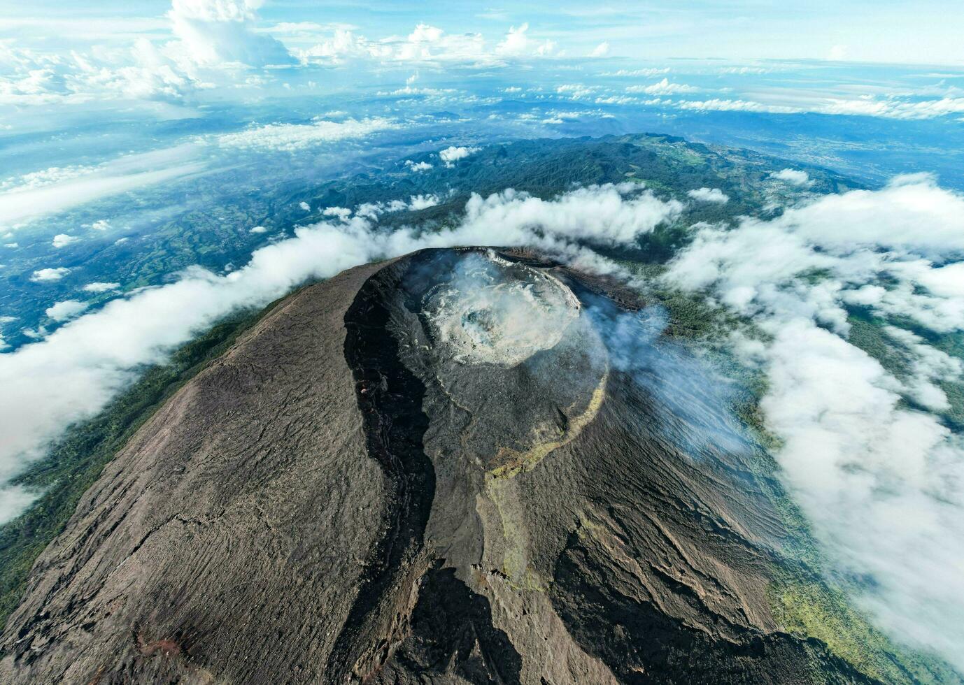 Aerial view of Mount Slamet or Gunung Slamet is an active stratovolcano ... Aerial view of Mount Slamet or Gunung Slamet is an active stratovolcano ...
