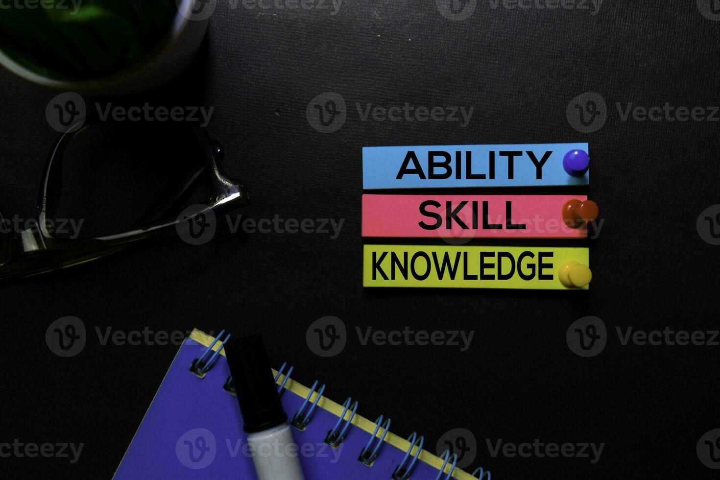 Ability, Skill, Knowledge text on sticky notes isolated on Black desk ...