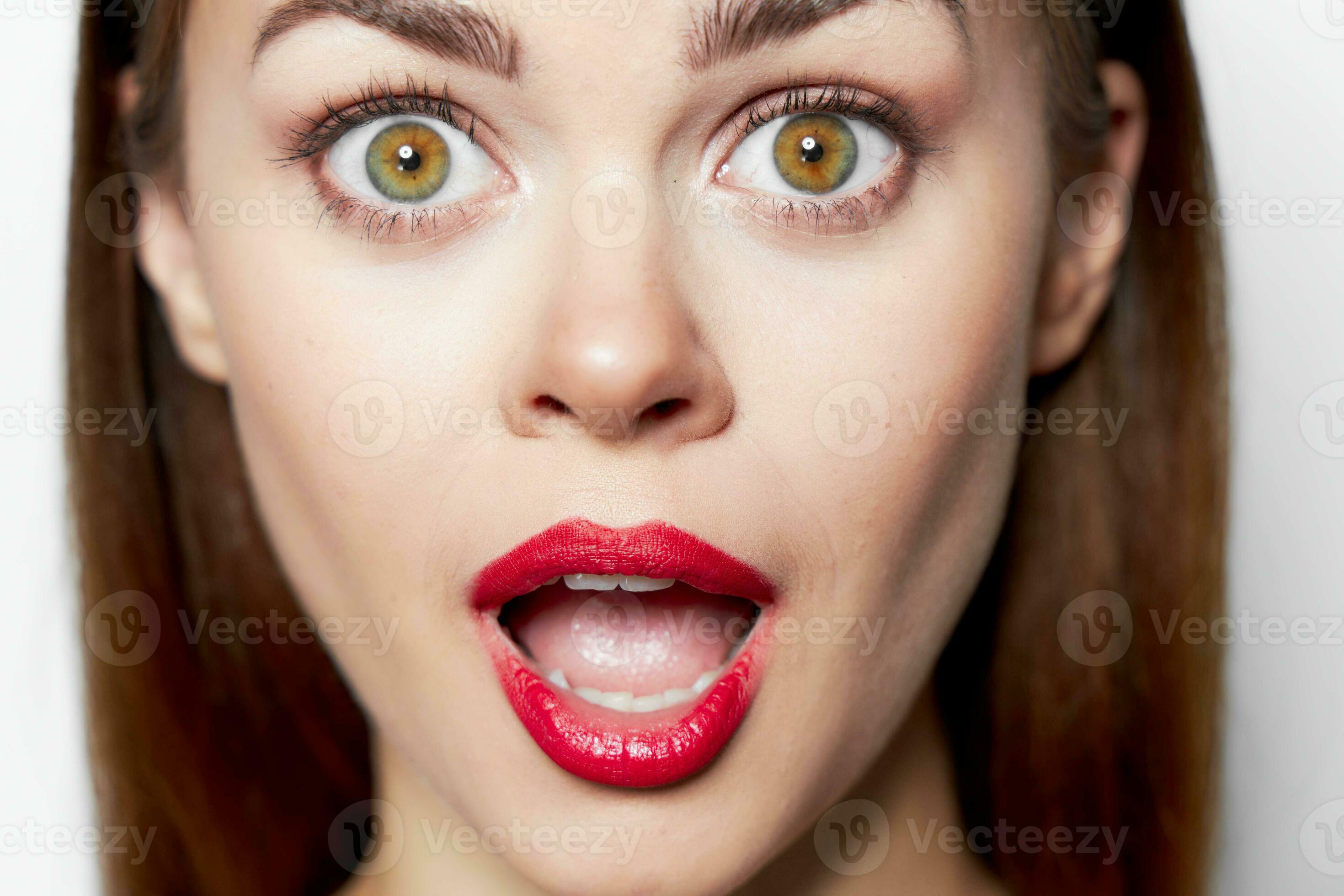Close-up woman face with open mouth and surprised eyes attractive ... Close-up woman face with open mouth and surprised eyes attractive ...