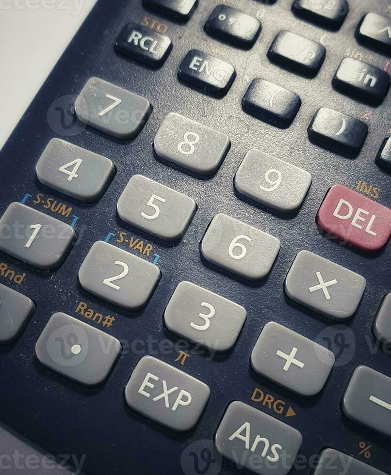 Close up photo of the buttons in the scientific calculator. 23720103 ...