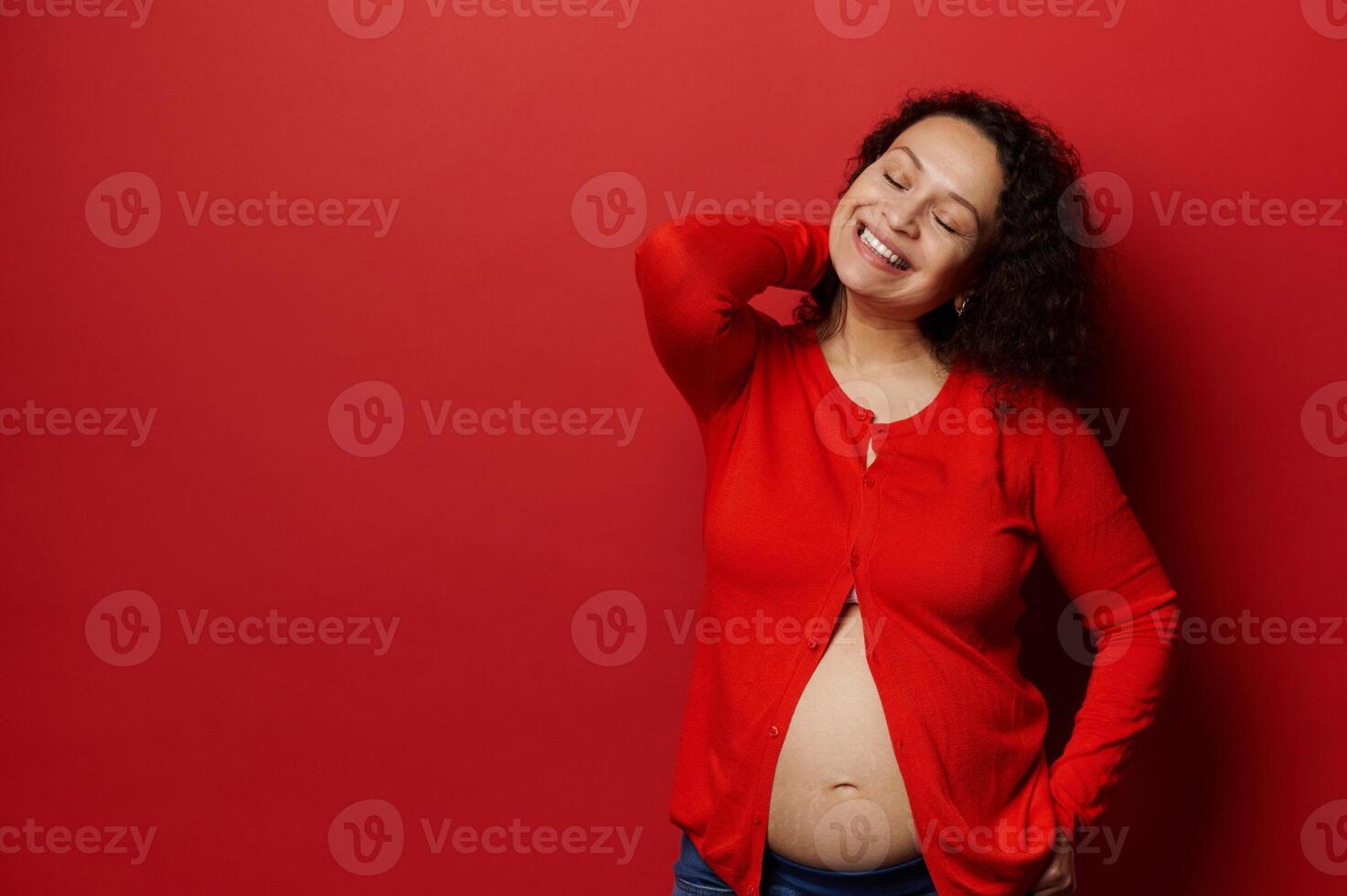 Authentic Pregnant Woman Posing Bare Belly And Closed Eyes Smiling