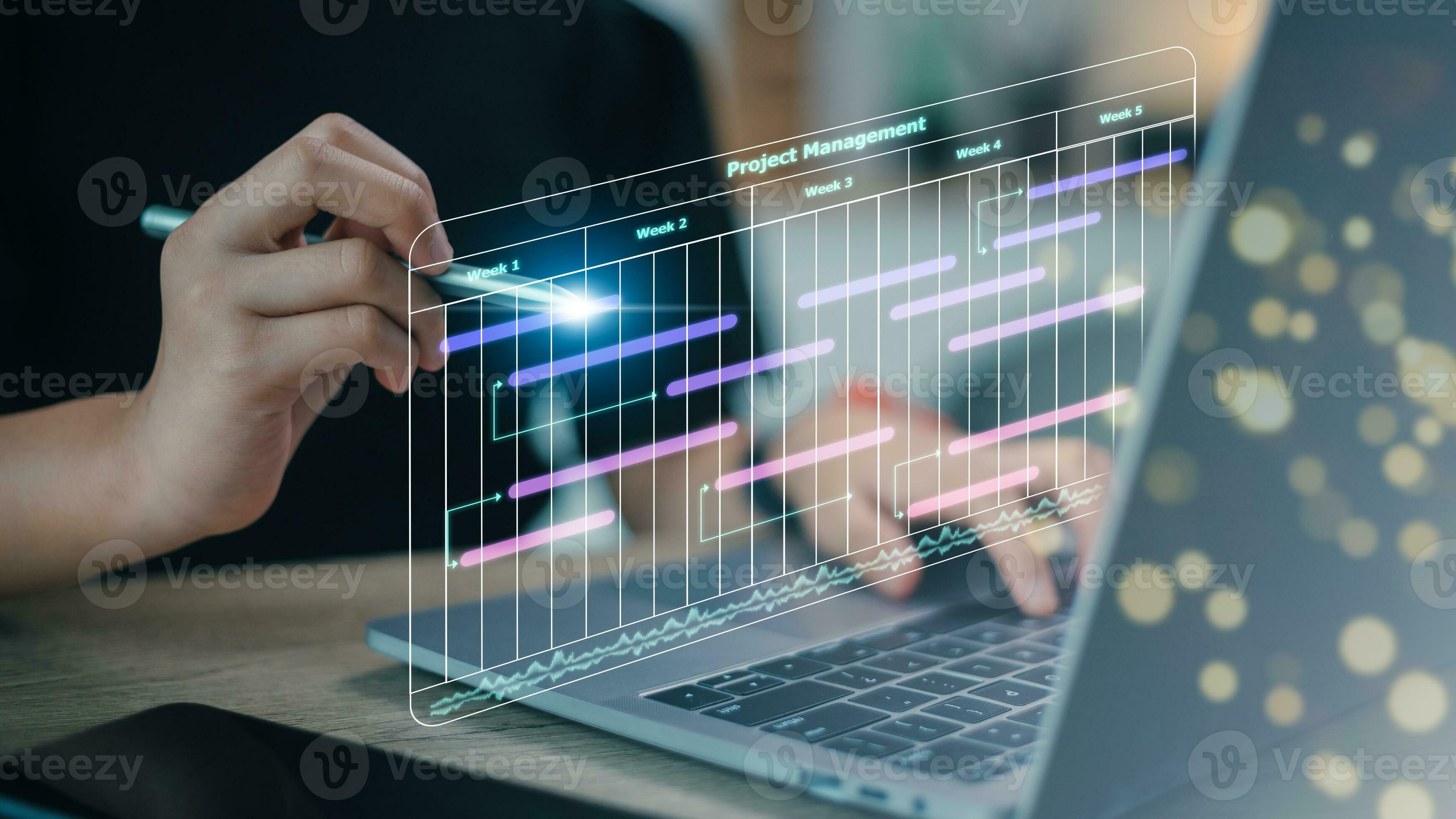 Business Project Management System. Project manager working on laptop and updating tasks and ...