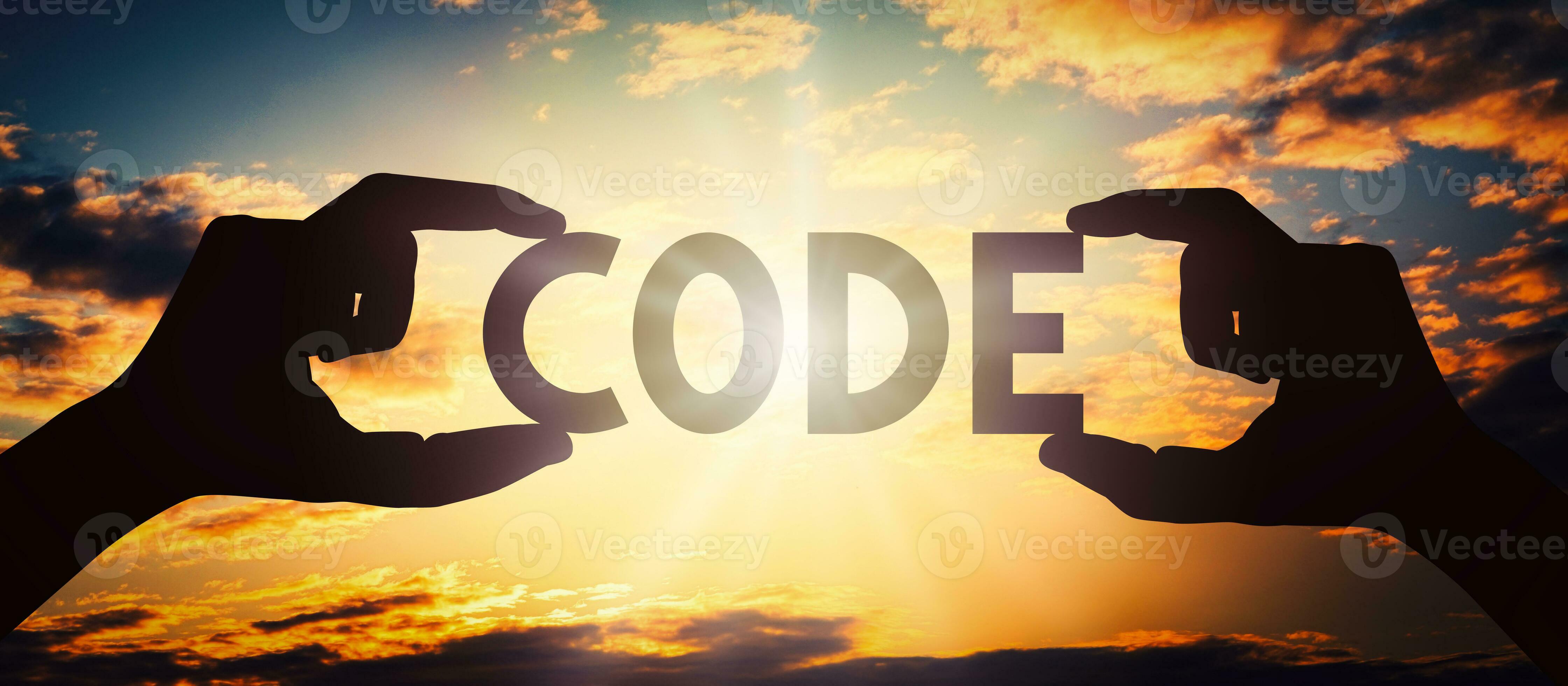 Code - Human Hands Holding Black Silhouette Word 23847800 Stock Photo ...