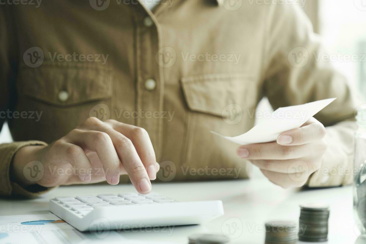 Accountant using calculator for calculate finance report in office ... Accountant using calculator for calculate finance report in office ...