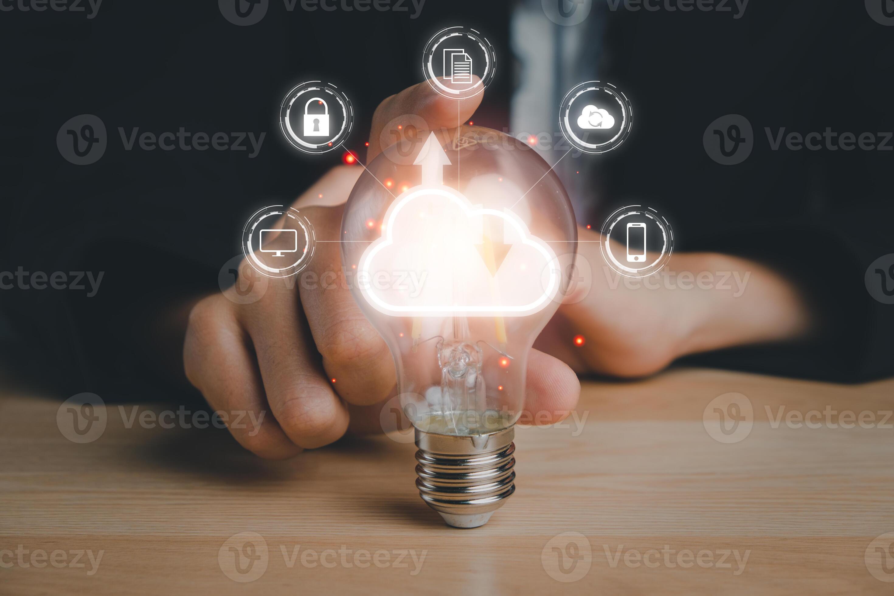 Woman hand touching lamp with cloud computing icon, Cloud computing concept, Backup Storage Data ...