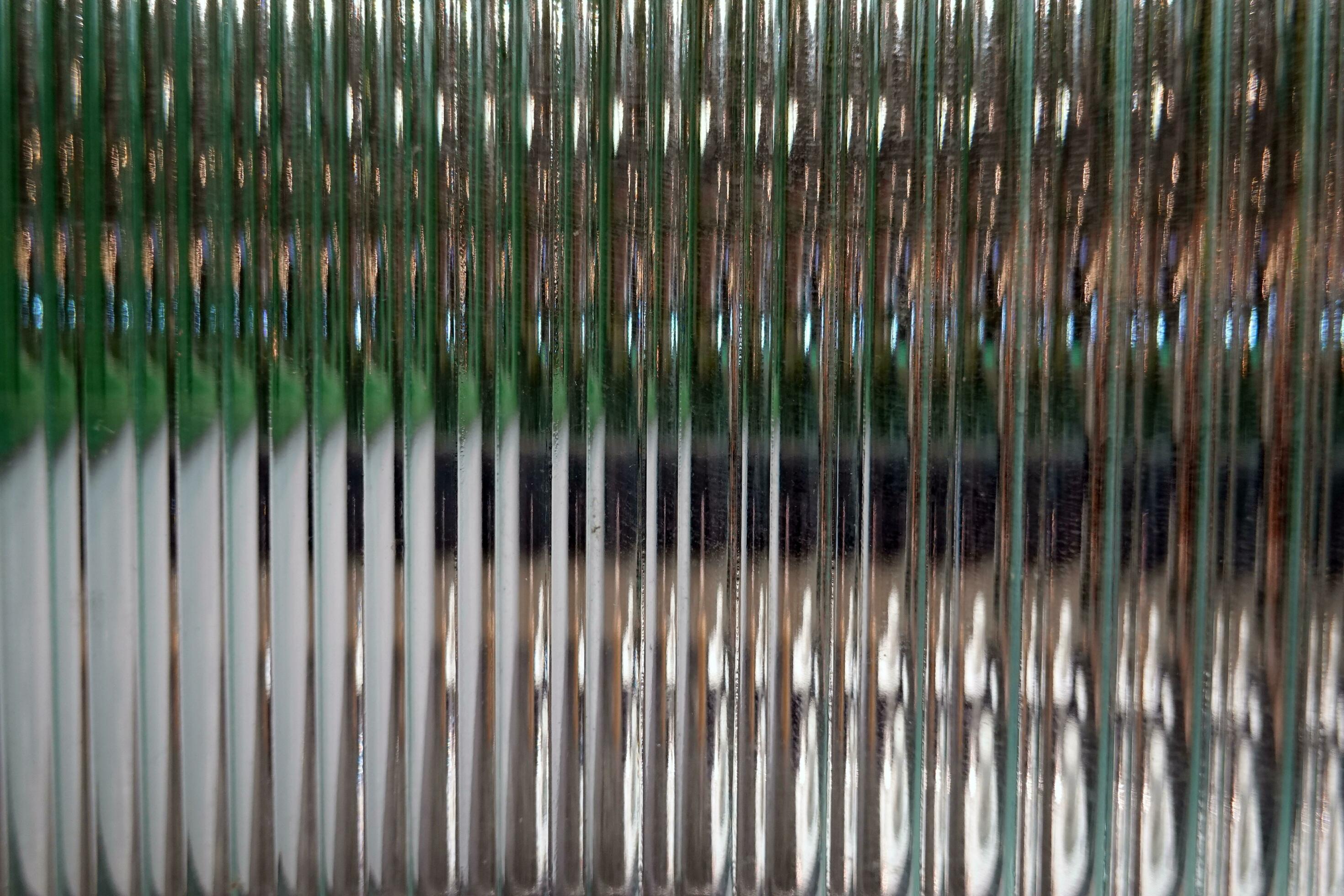 Patterned glass texture background. Light reflection displacement ... Patterned glass texture background. Light reflection displacement ...