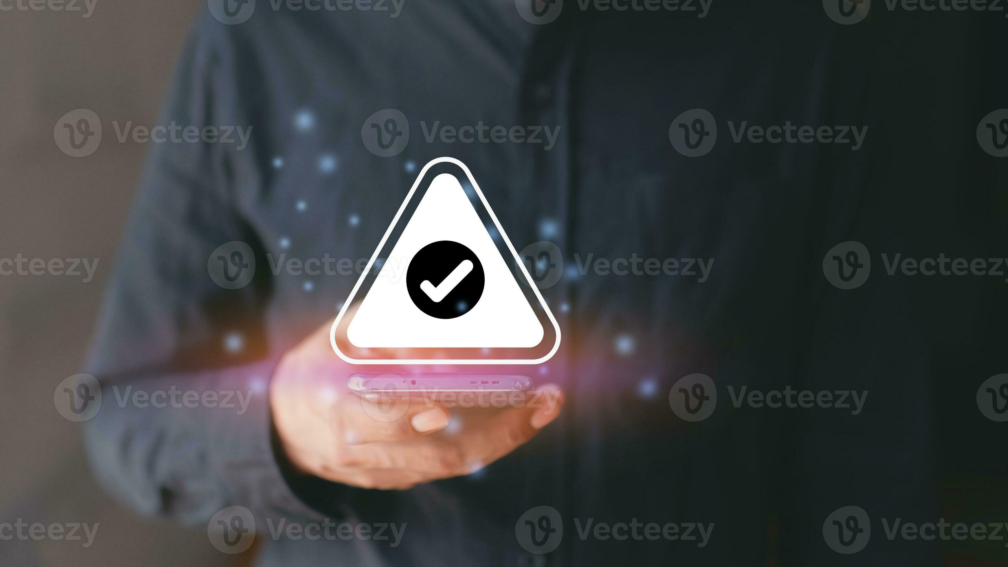 Staff Of Developer Programmers Using Smart Phones With Triangular Caution Warning Sign Remote
