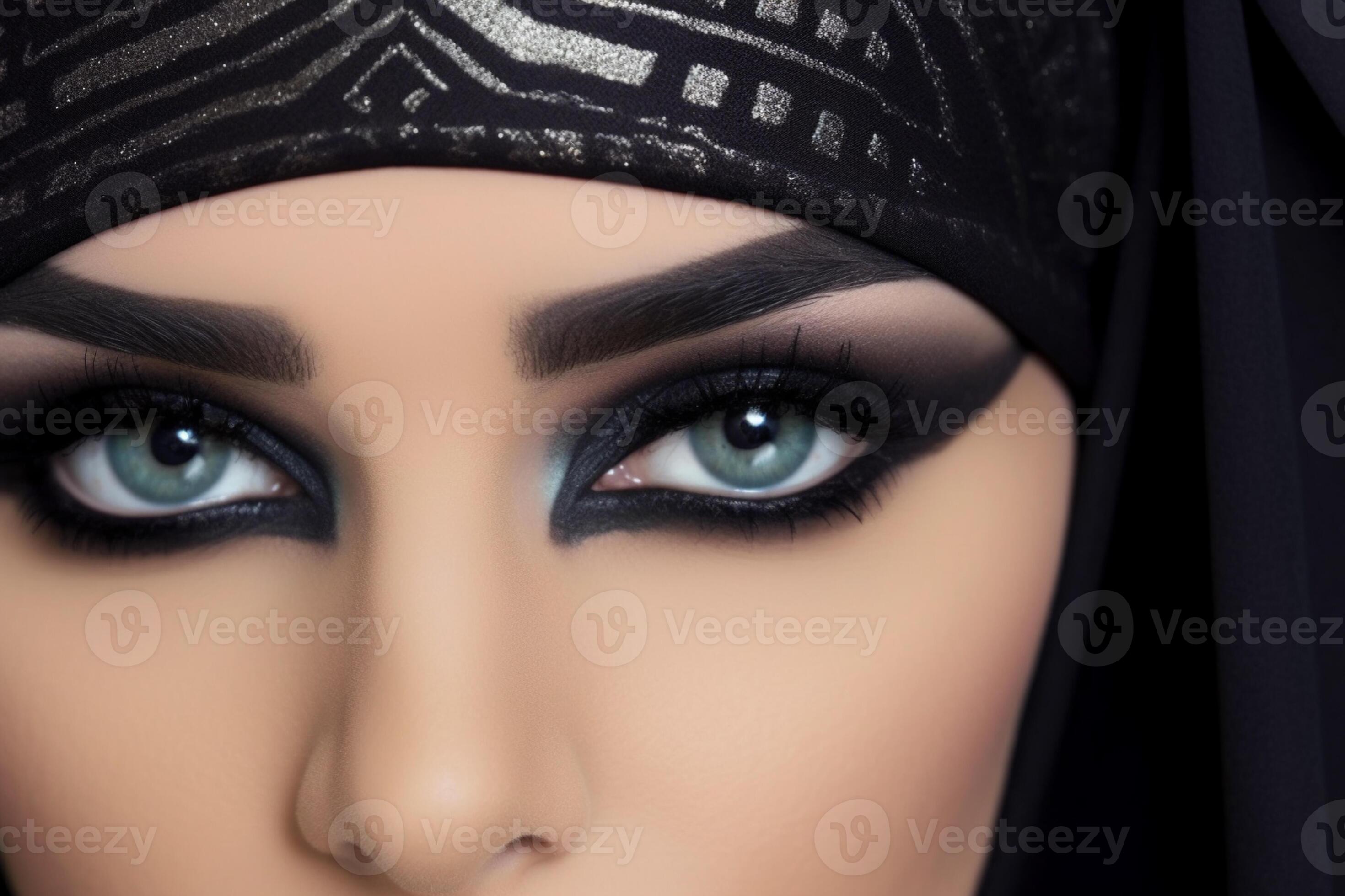 Portrait Of Beautiful Arab Woman With Blue Eyes Wearing Black Scarf
