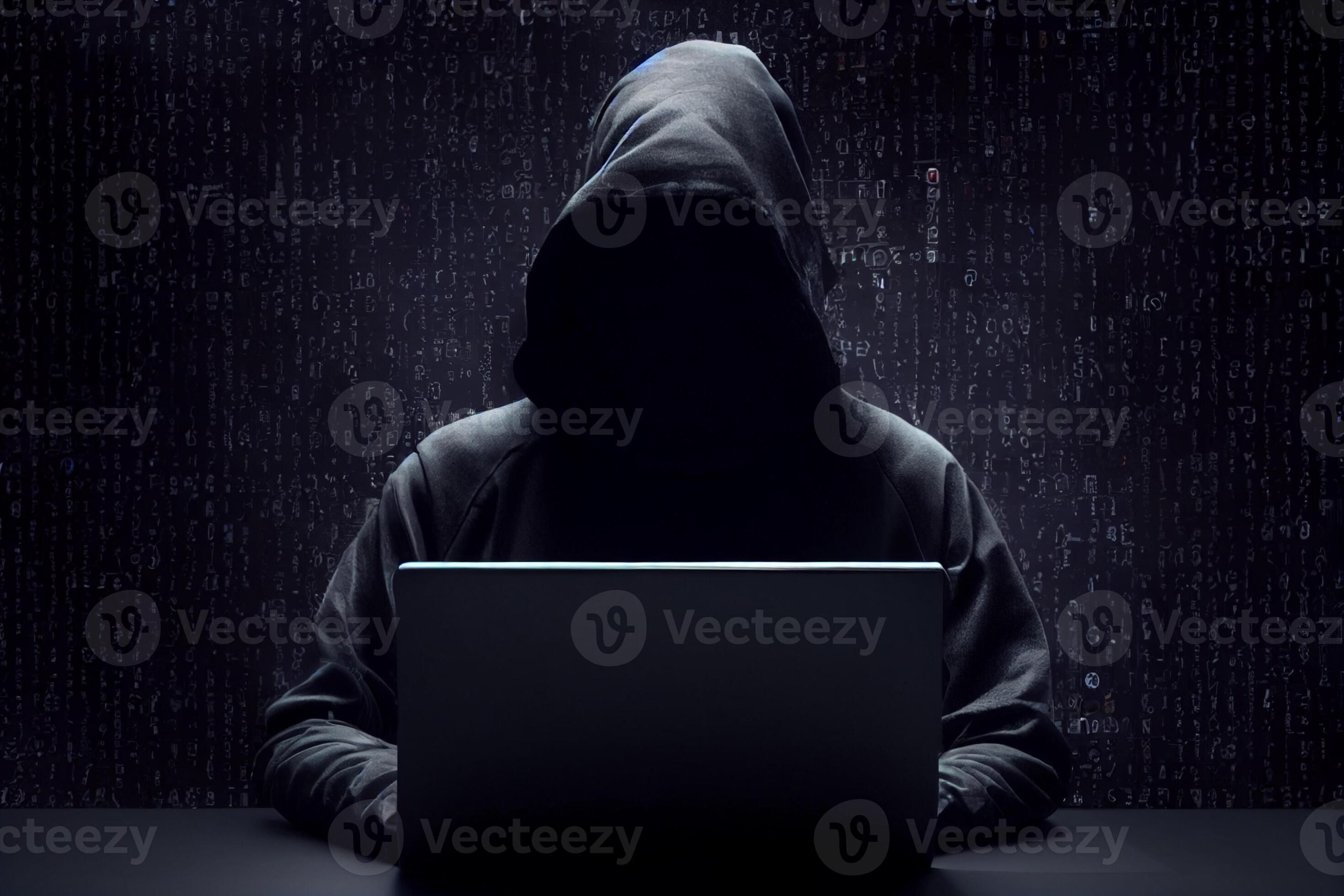 Anonymous Hacker Without Face Typing Computer Laptop Concept Of
