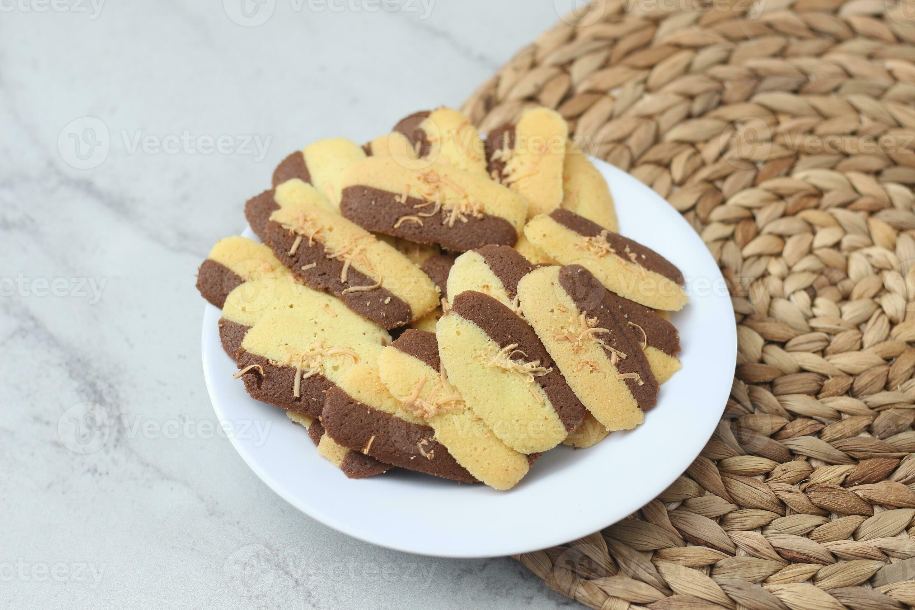 Kue Lidah Kucing or cat tongue cookies. 24311820 Stock Photo at Vecteezy Kue Lidah Kucing or cat tongue cookies. 24311820 Stock Photo at Vecteezy