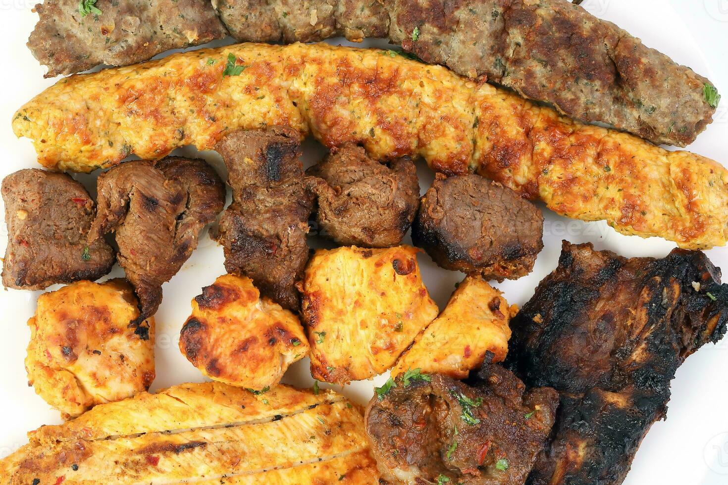 Mixed charcoal grilled platter chicken beef mutton goat meat shish ...