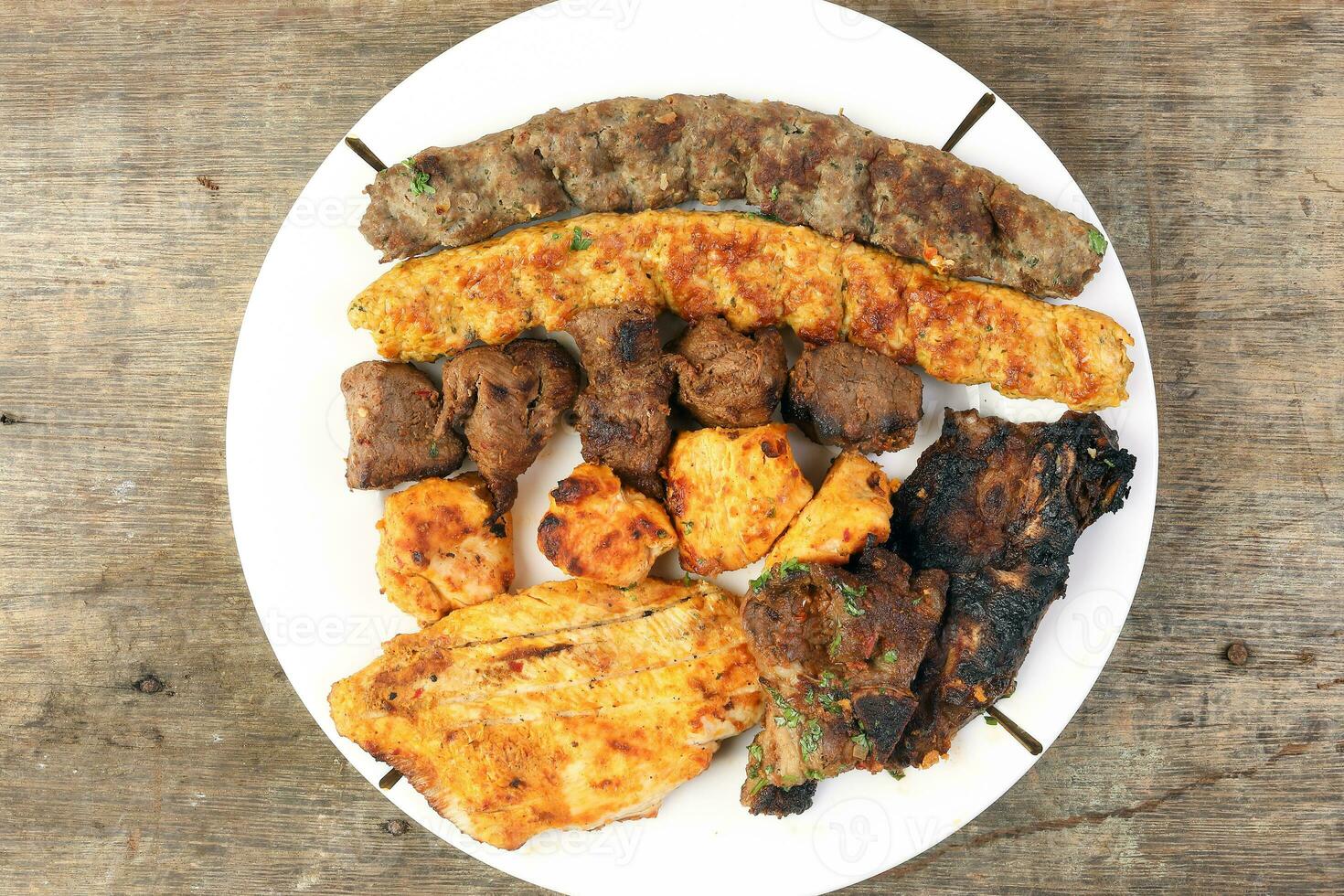 Mixed charcoal grilled platter chicken beef mutton goat meat shish ...