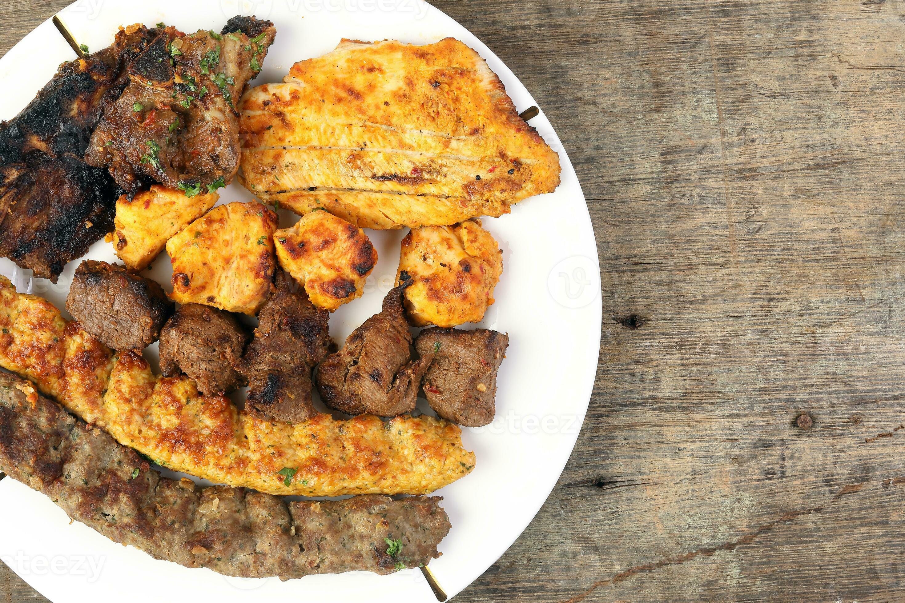 Mixed charcoal grilled platter chicken beef mutton goat meat shish ...