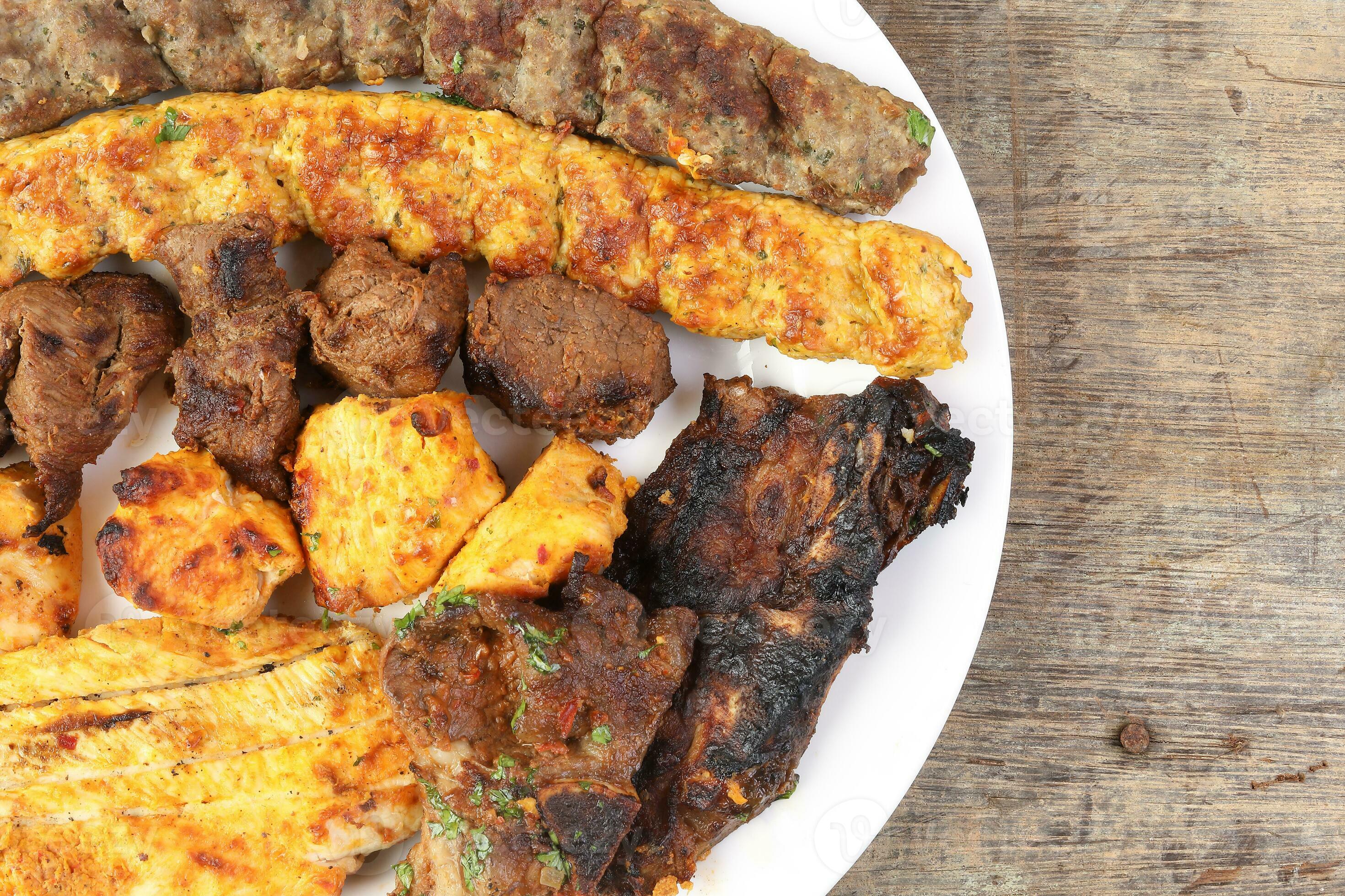 Mixed charcoal grilled platter chicken beef mutton goat meat shish ...