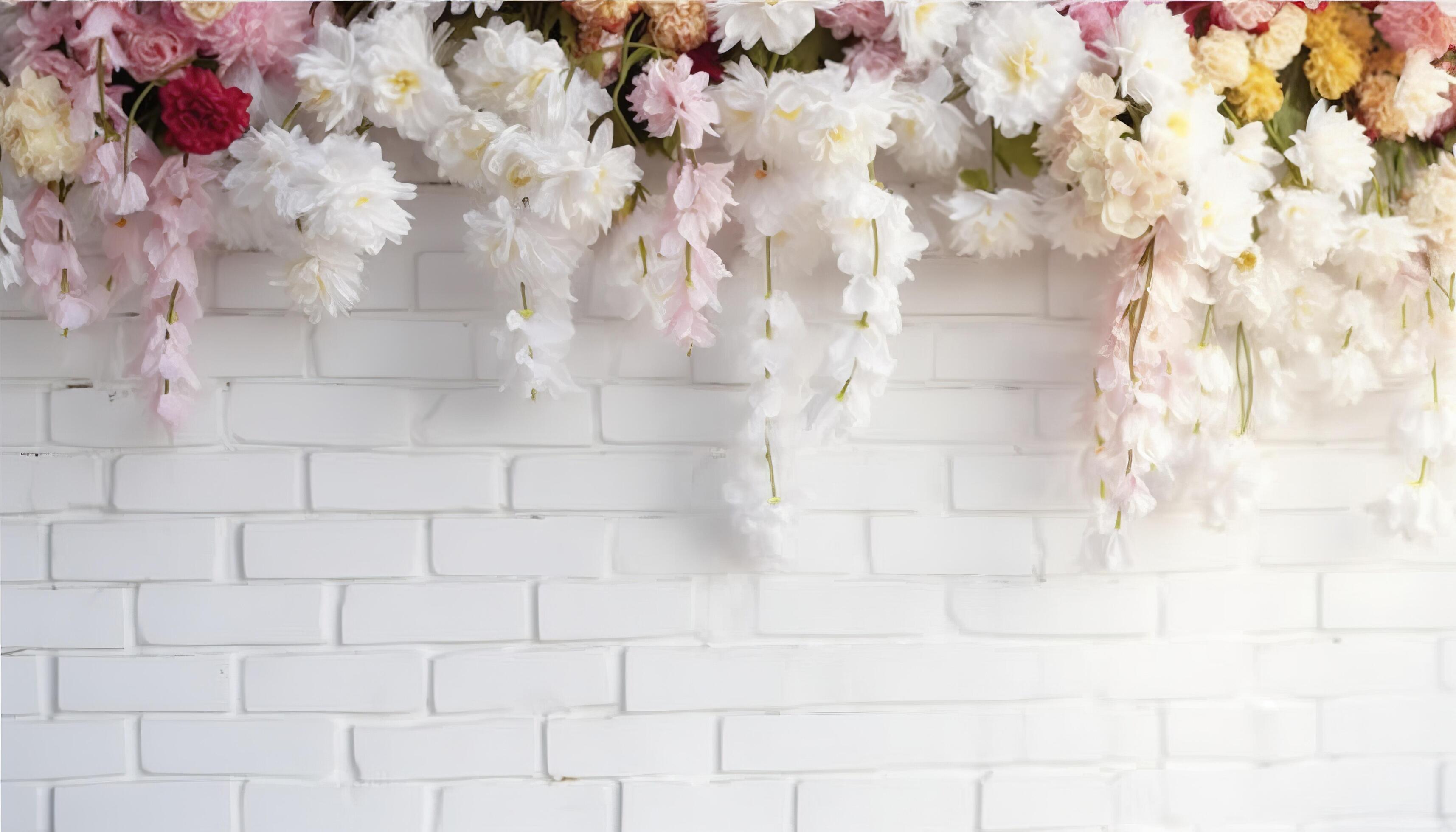 Flower texture background for wedding scene. Flowers on white brick wall with free space for ...
